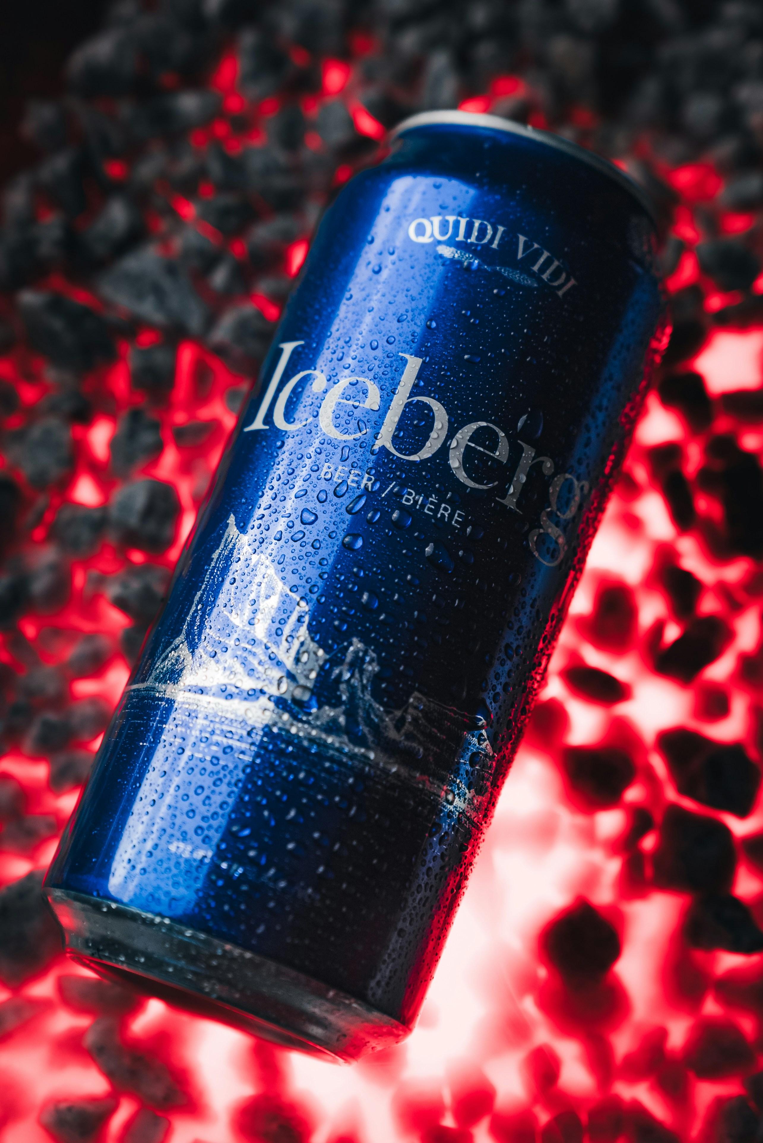 Ember-Glazed Iceberg: a cobalt can among red-hot coals