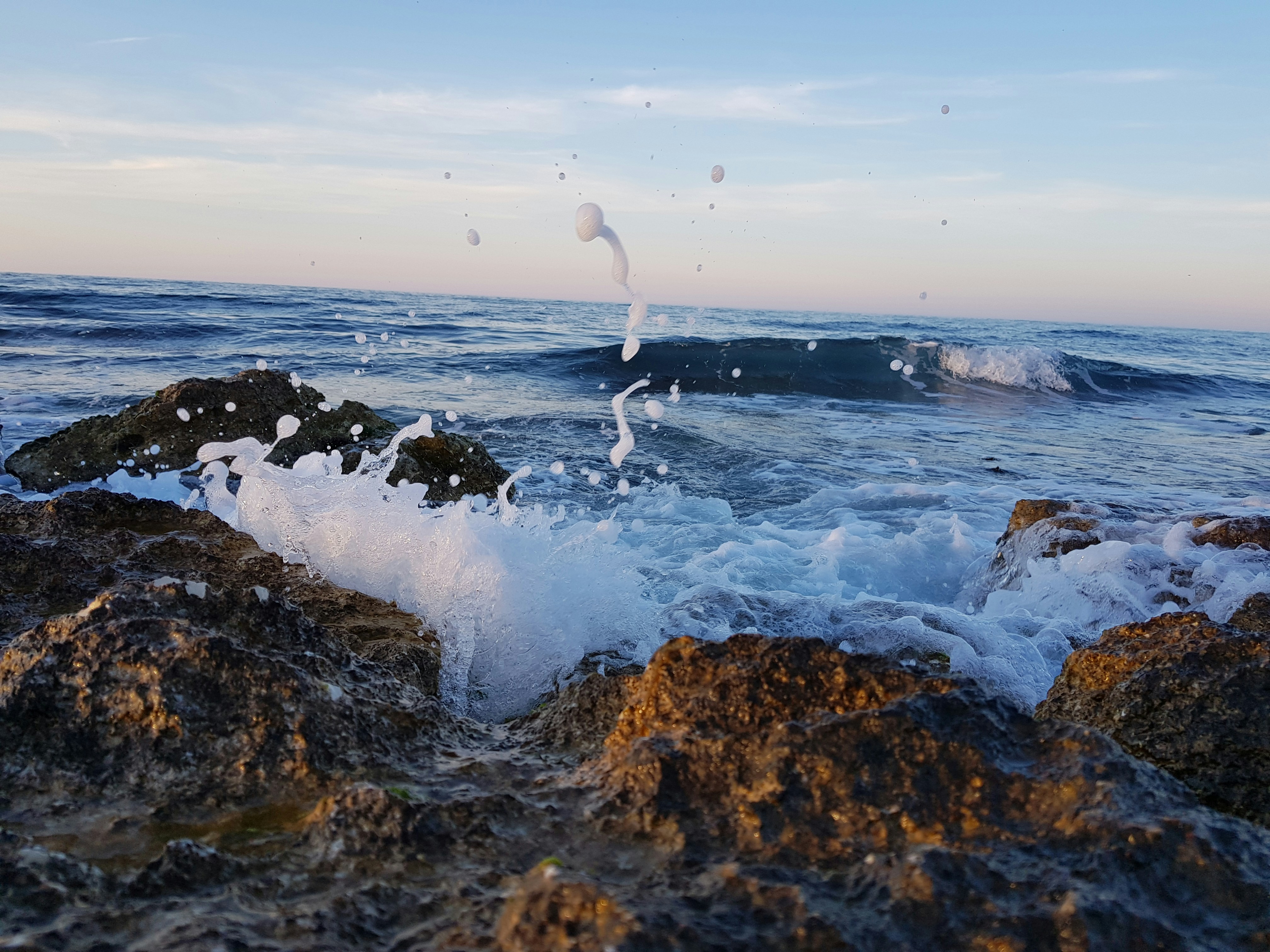 Ocean's Dance on Rocky Shores