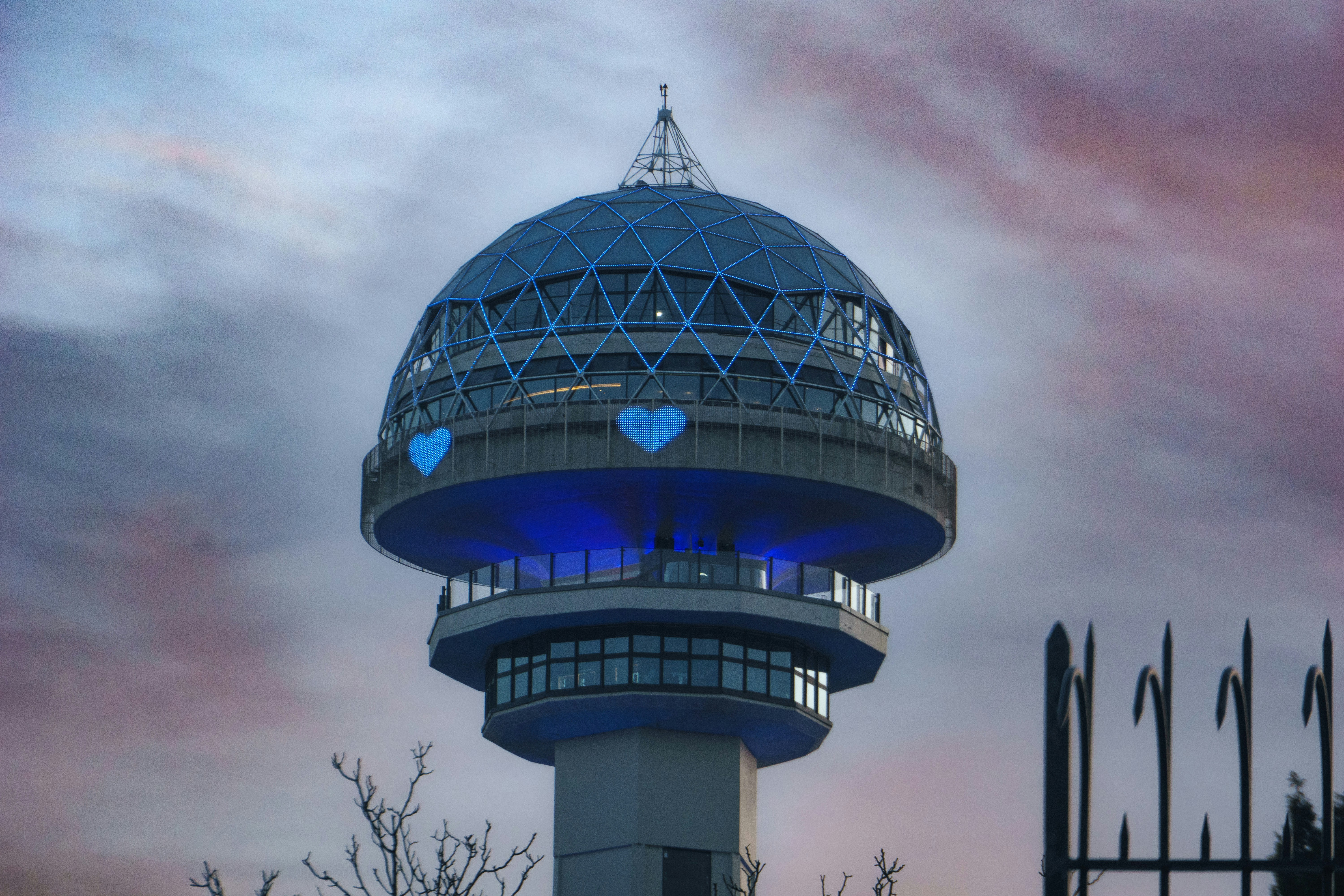 Spherical Observatory Crown Under a Painted Sky