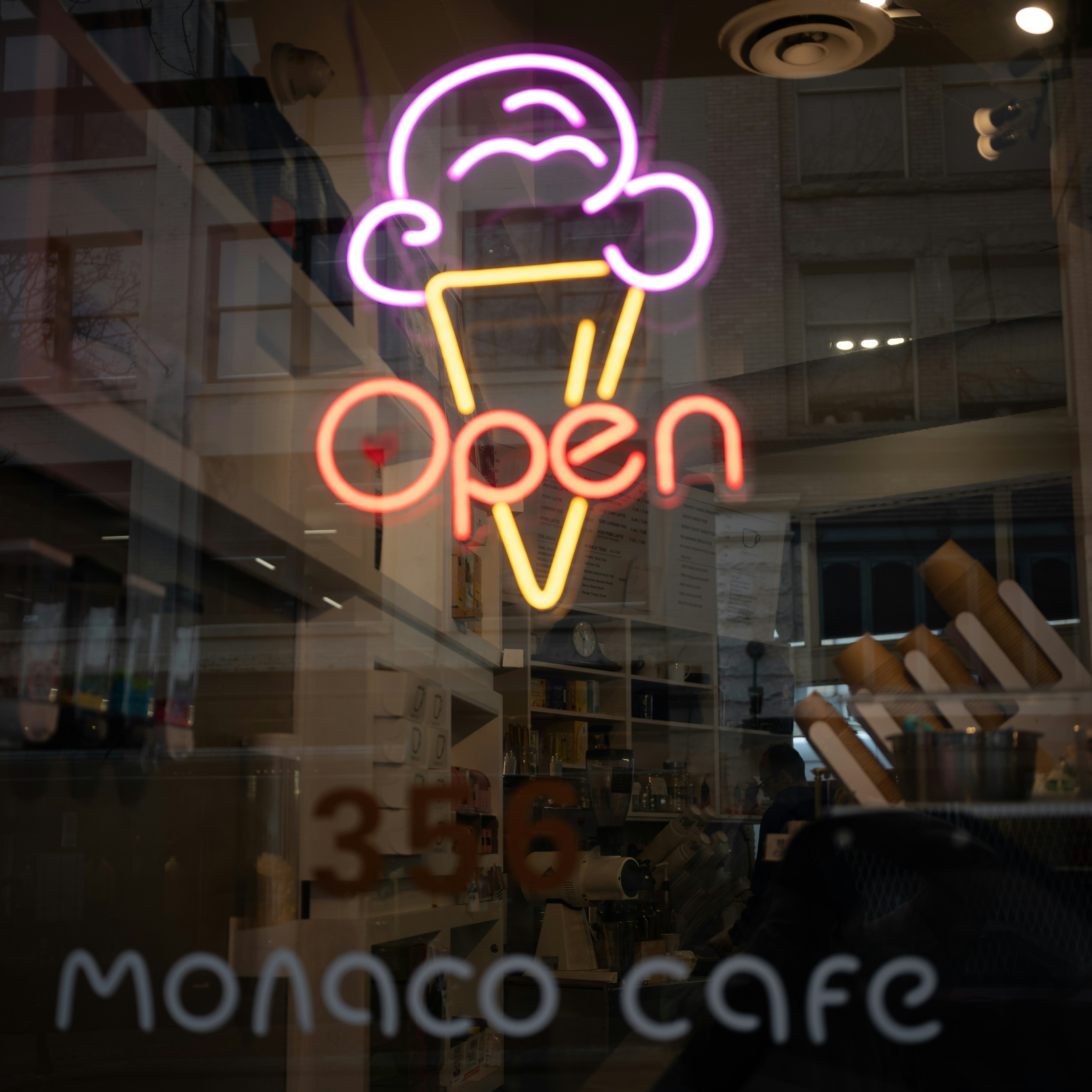 A neon sign in the window of a cafe photo – Free Vancouver Image on ...