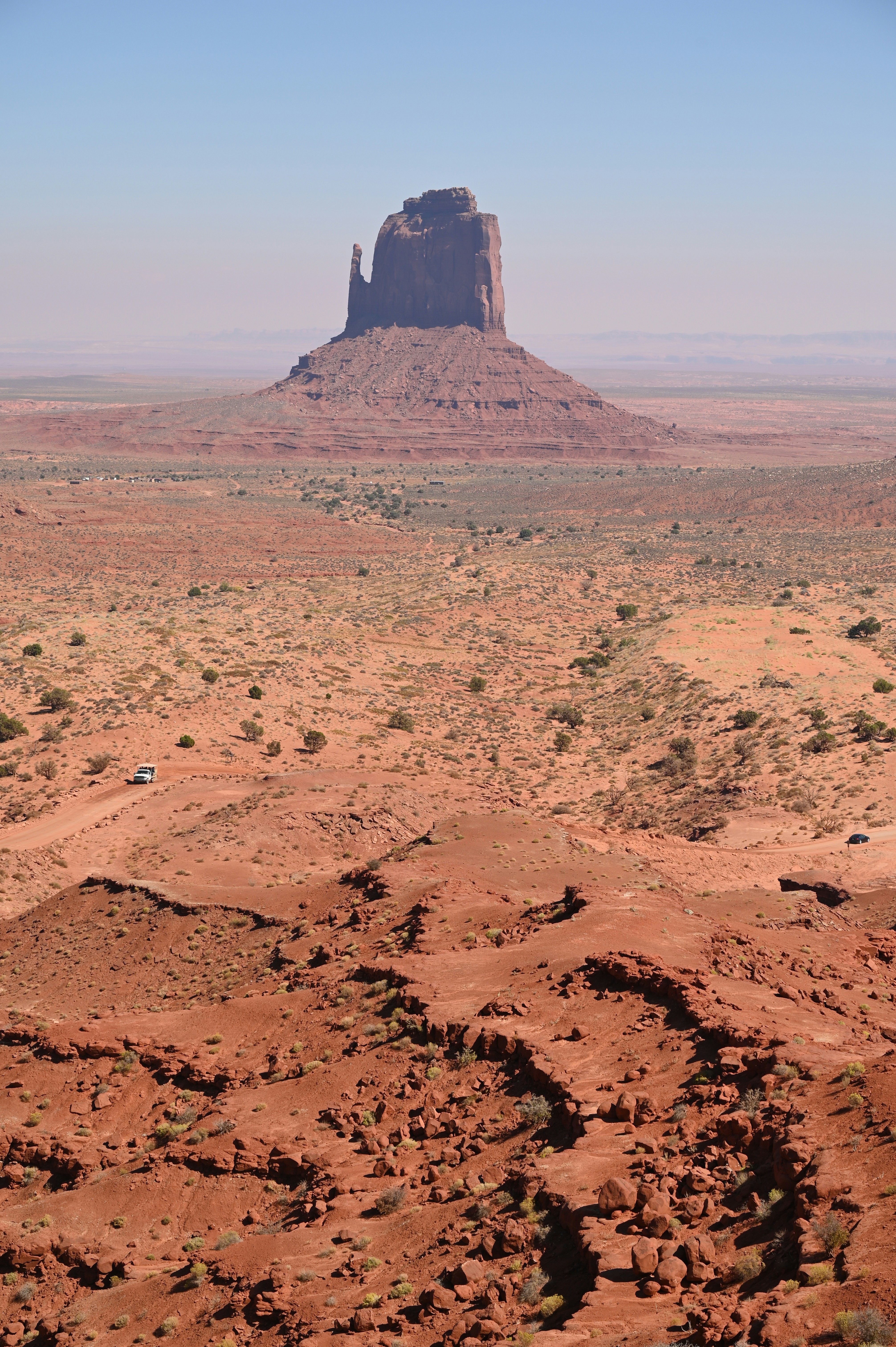 Red Sentinel Rising Over the Desert Plain