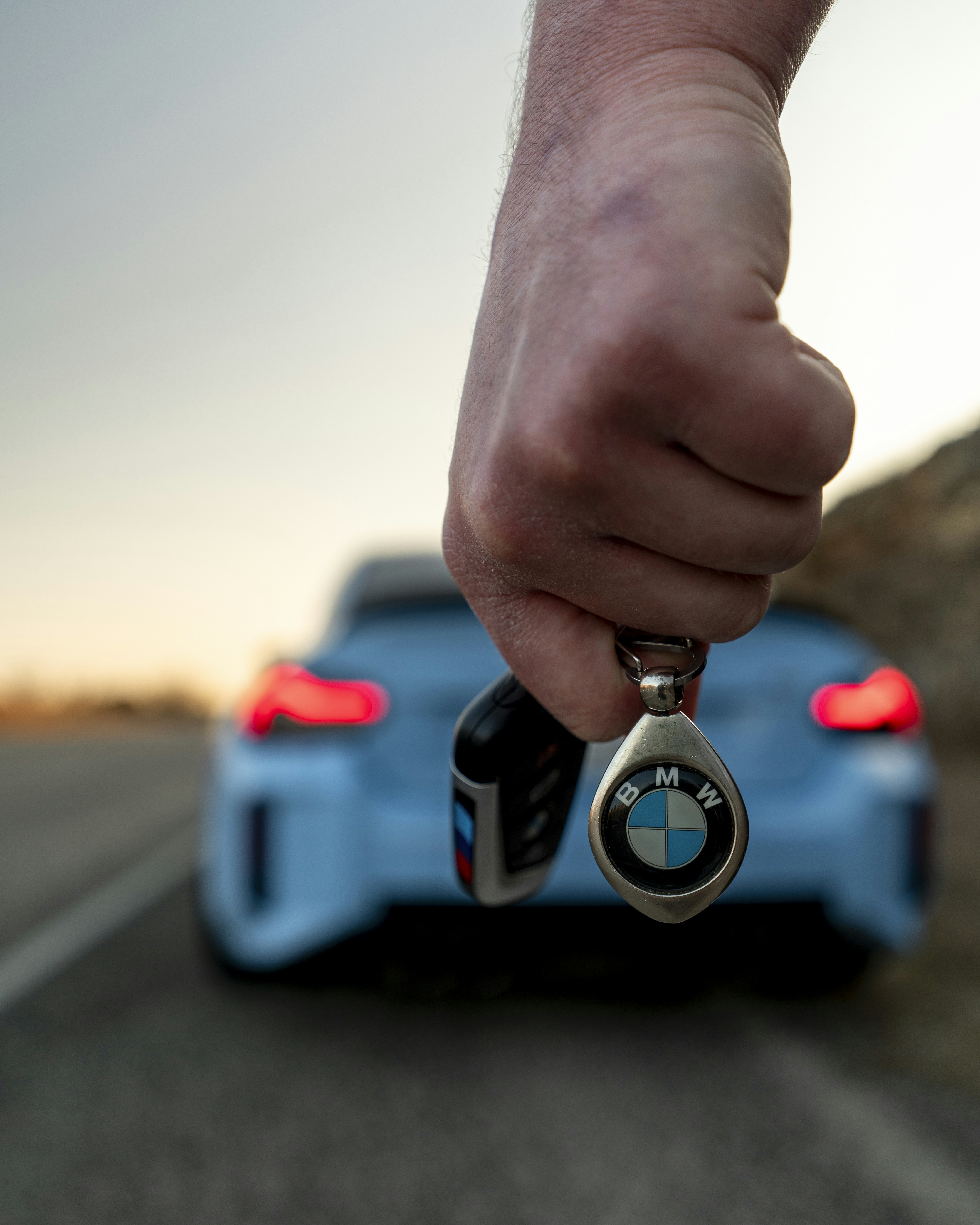 Key Grip, Blue Blur: A Sunset Roadster Reaching for the Horizon
