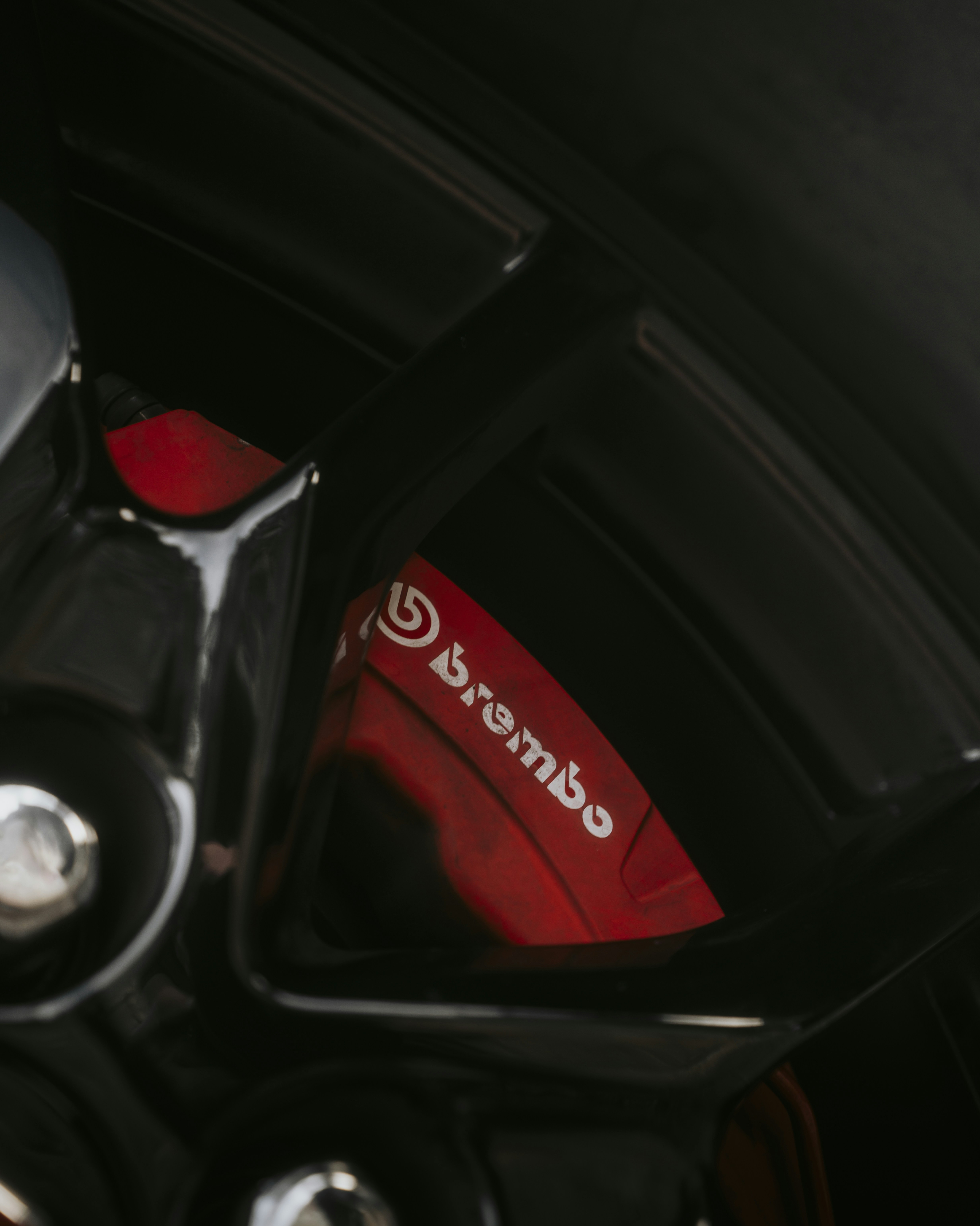 A close up of a motorcycle tire with a red brake pad photo – Free Civic ...