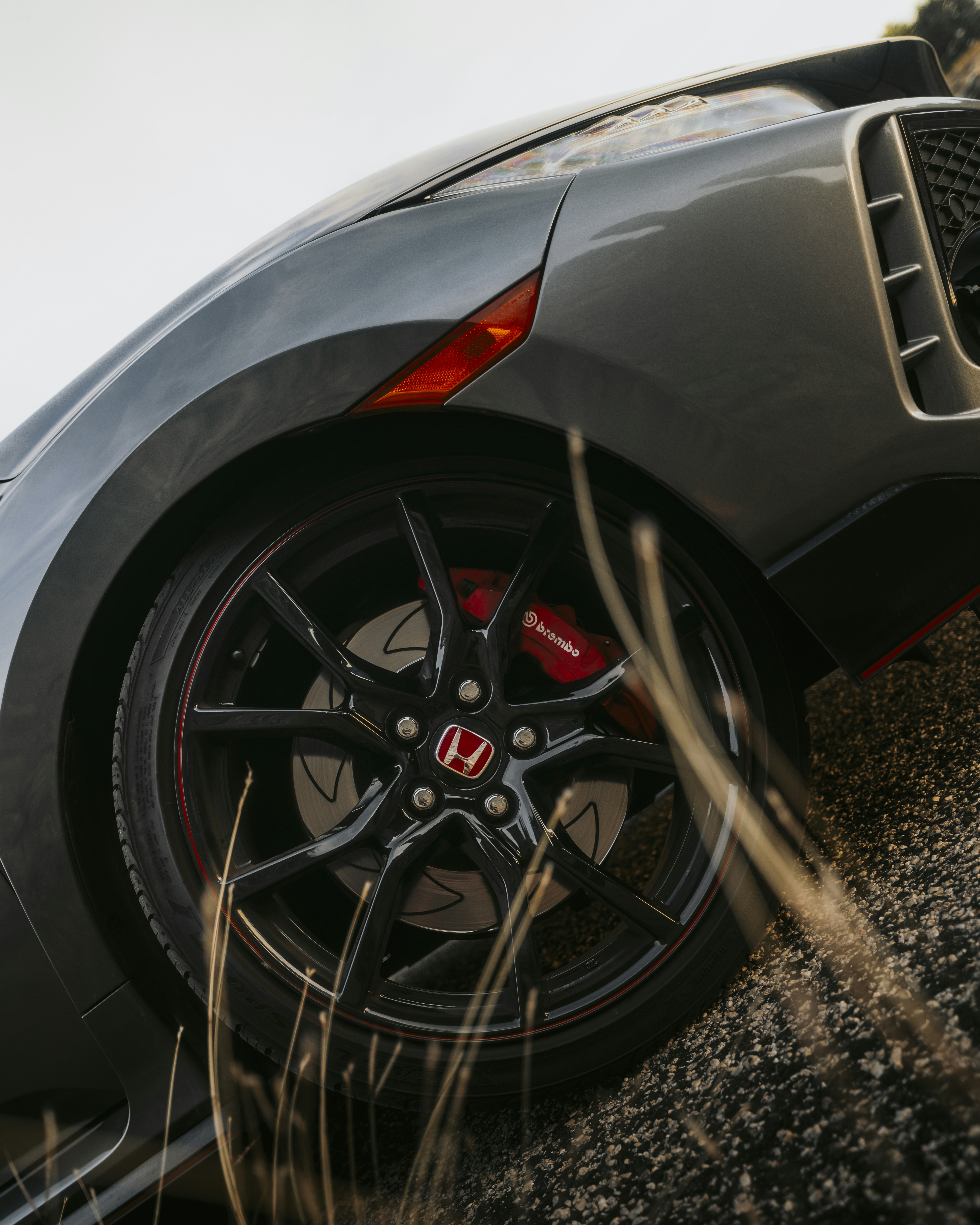 A black sports car parked on the side of the road photo – Free Civic ...