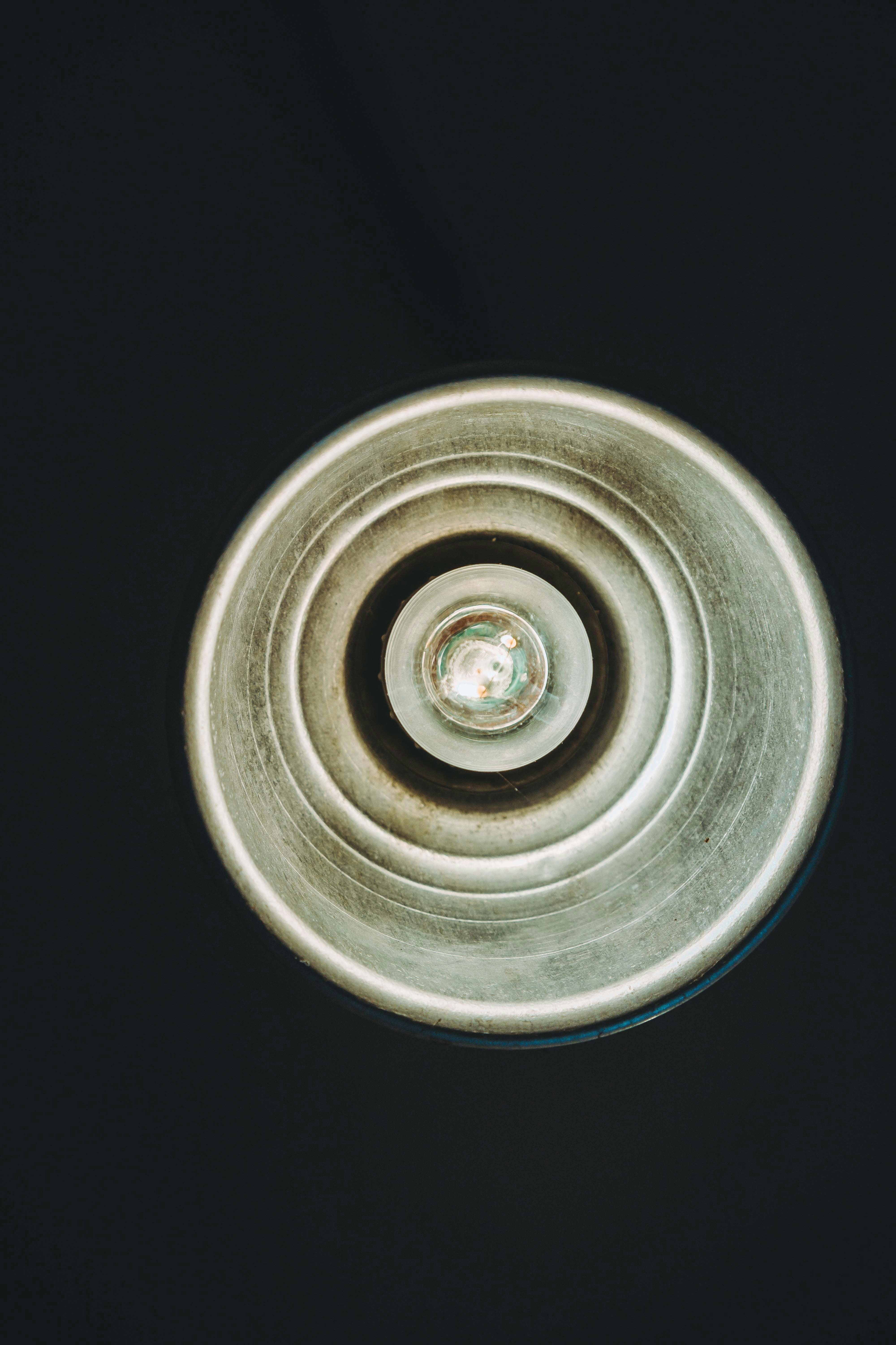 A close up of a metal object on a black background photo – Free Food ...