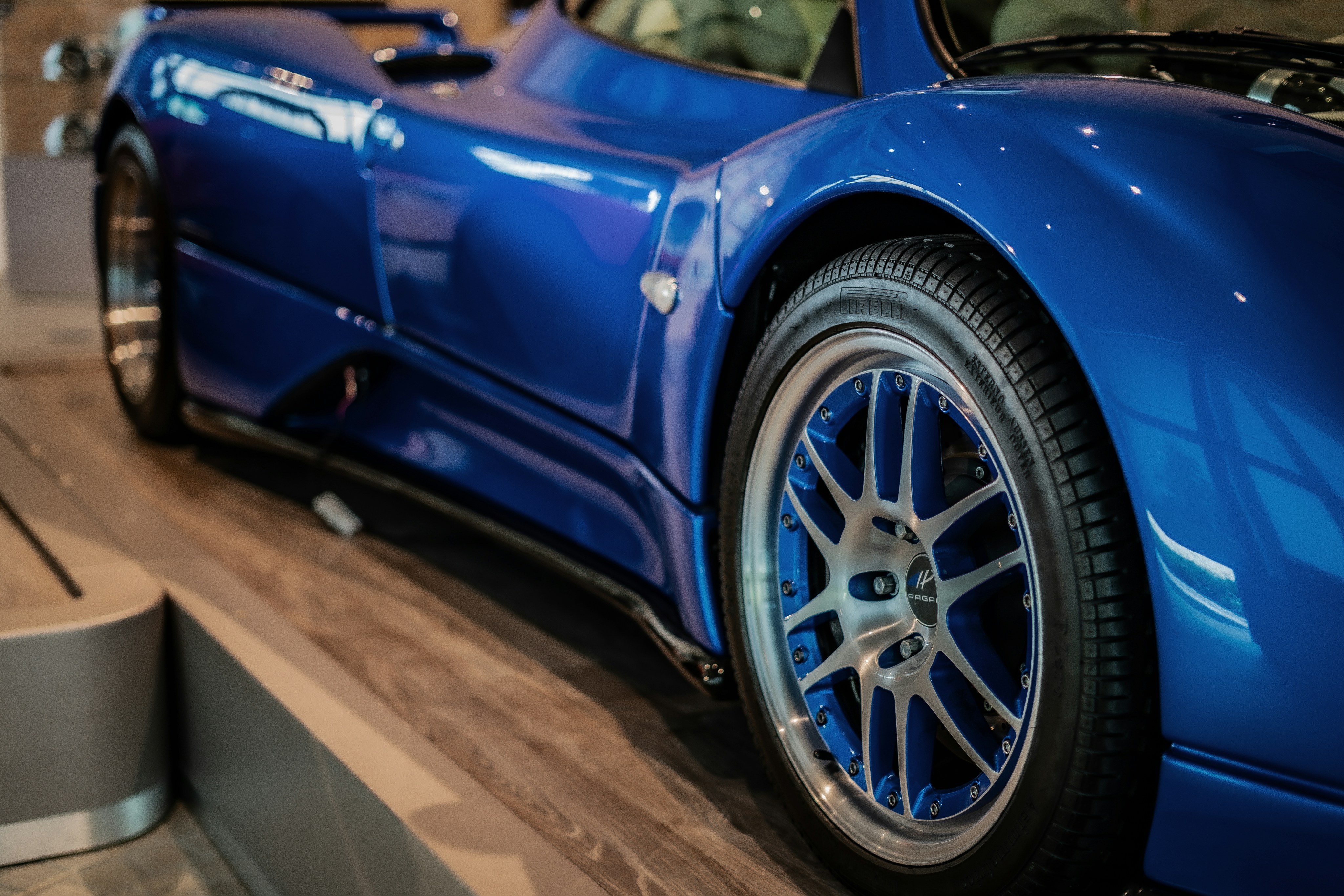 A blue sports car on display at a car show photo – Free Car Image on ...