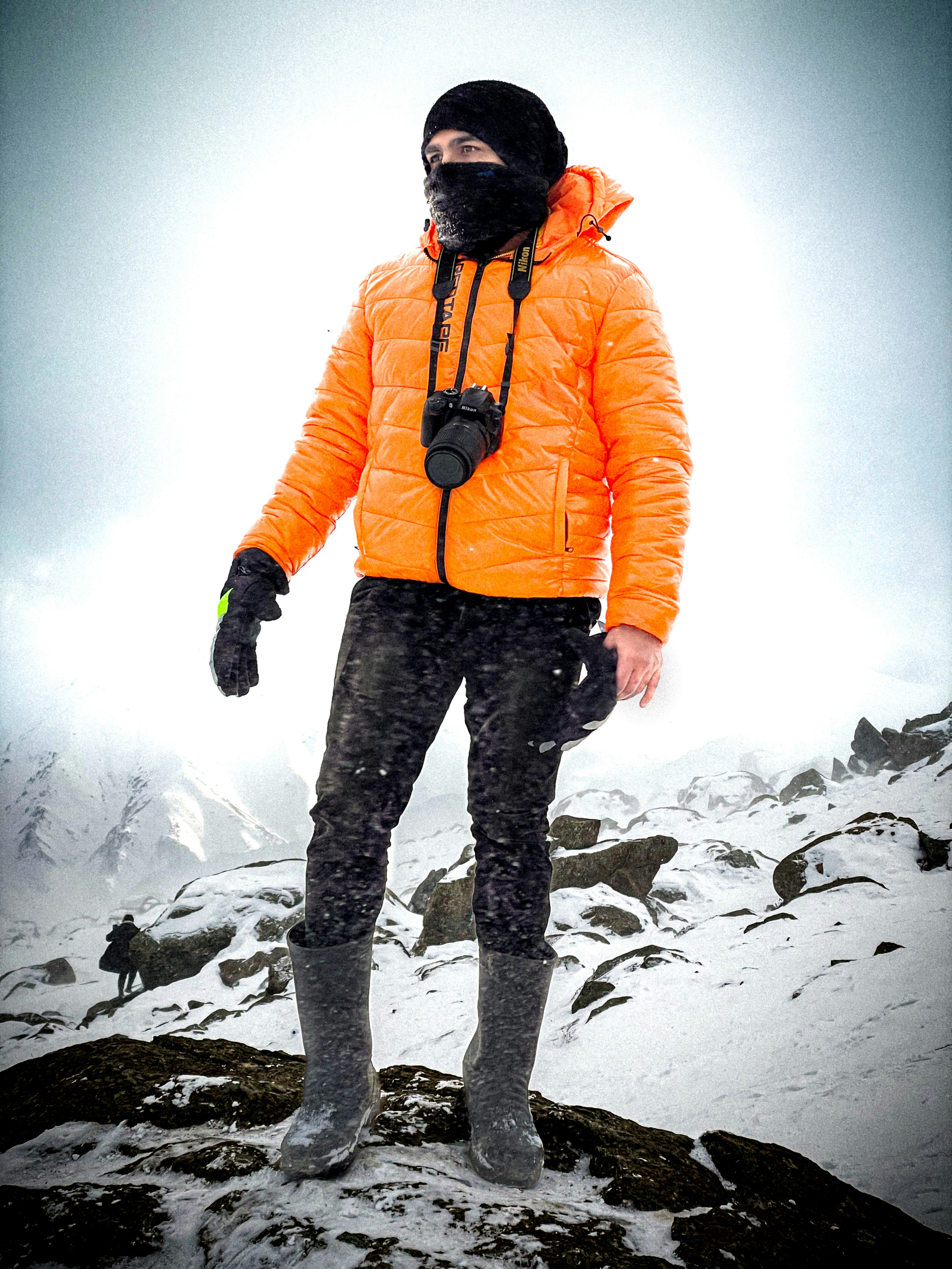 A Bold Adventurer Amidst the Snowy Peaks