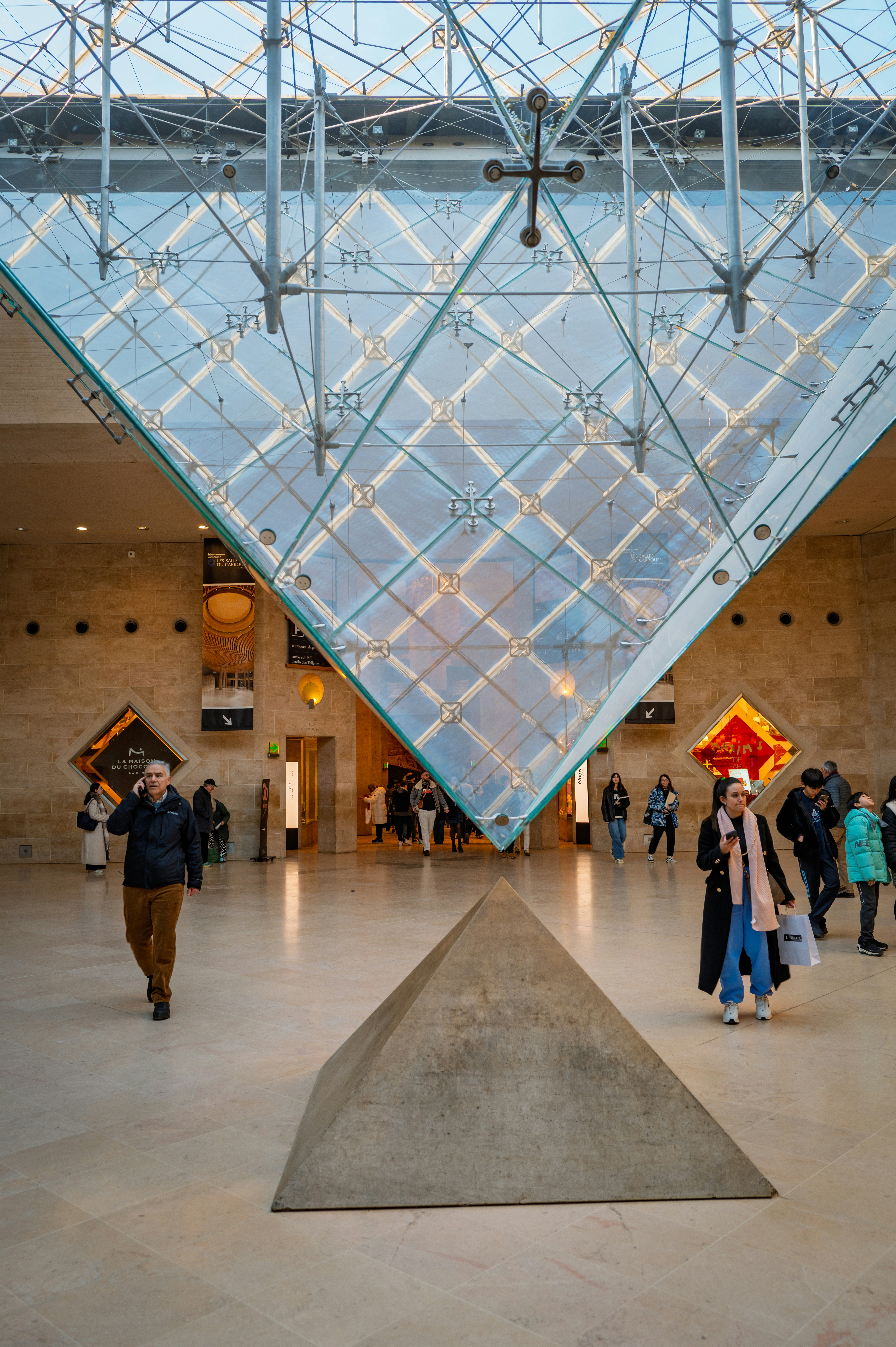 A group of people walking around a museum photo – Free Louvre ...