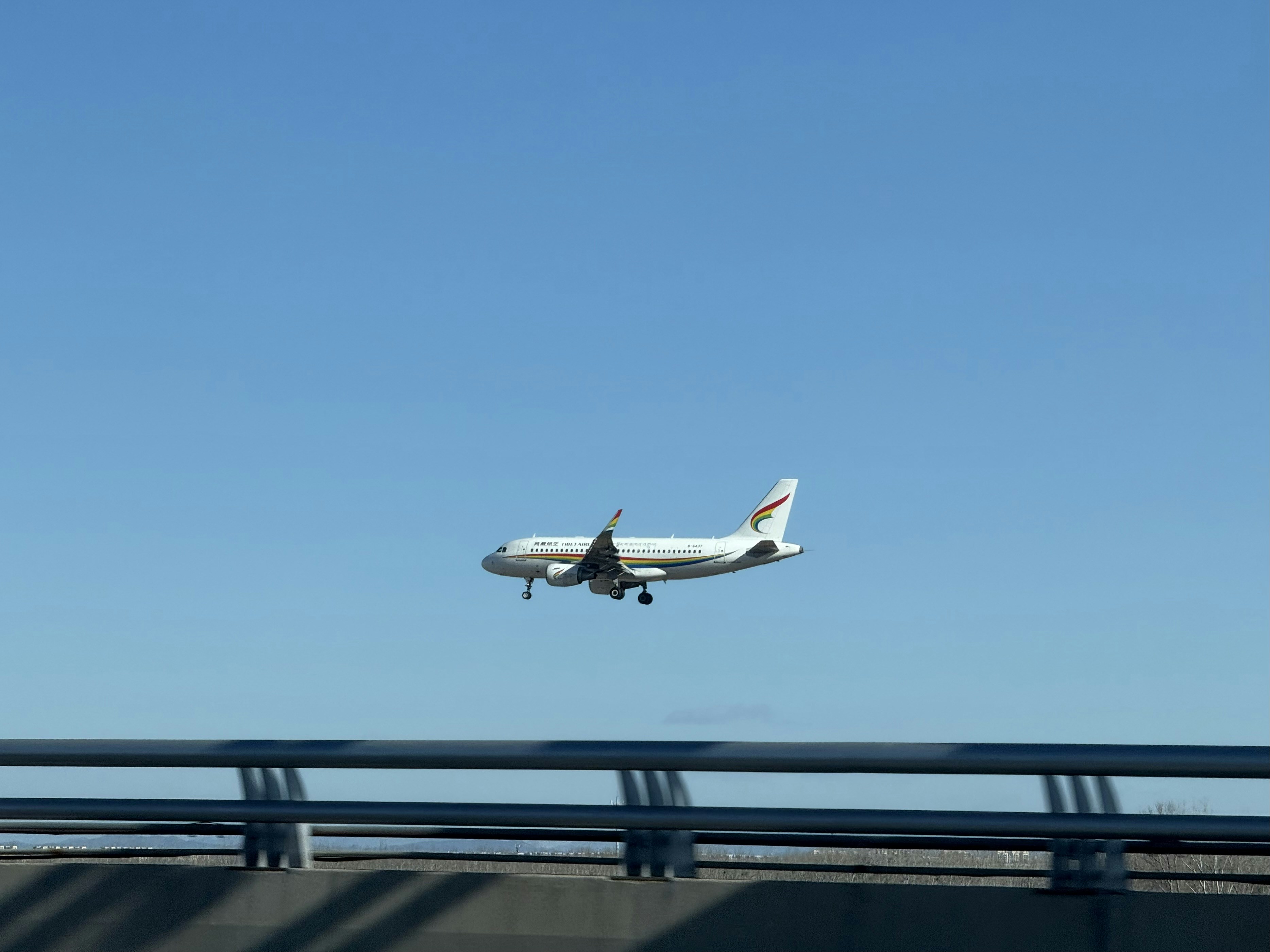 Jet Above the Rail: A Crisp Approach Under Cerulean Skies