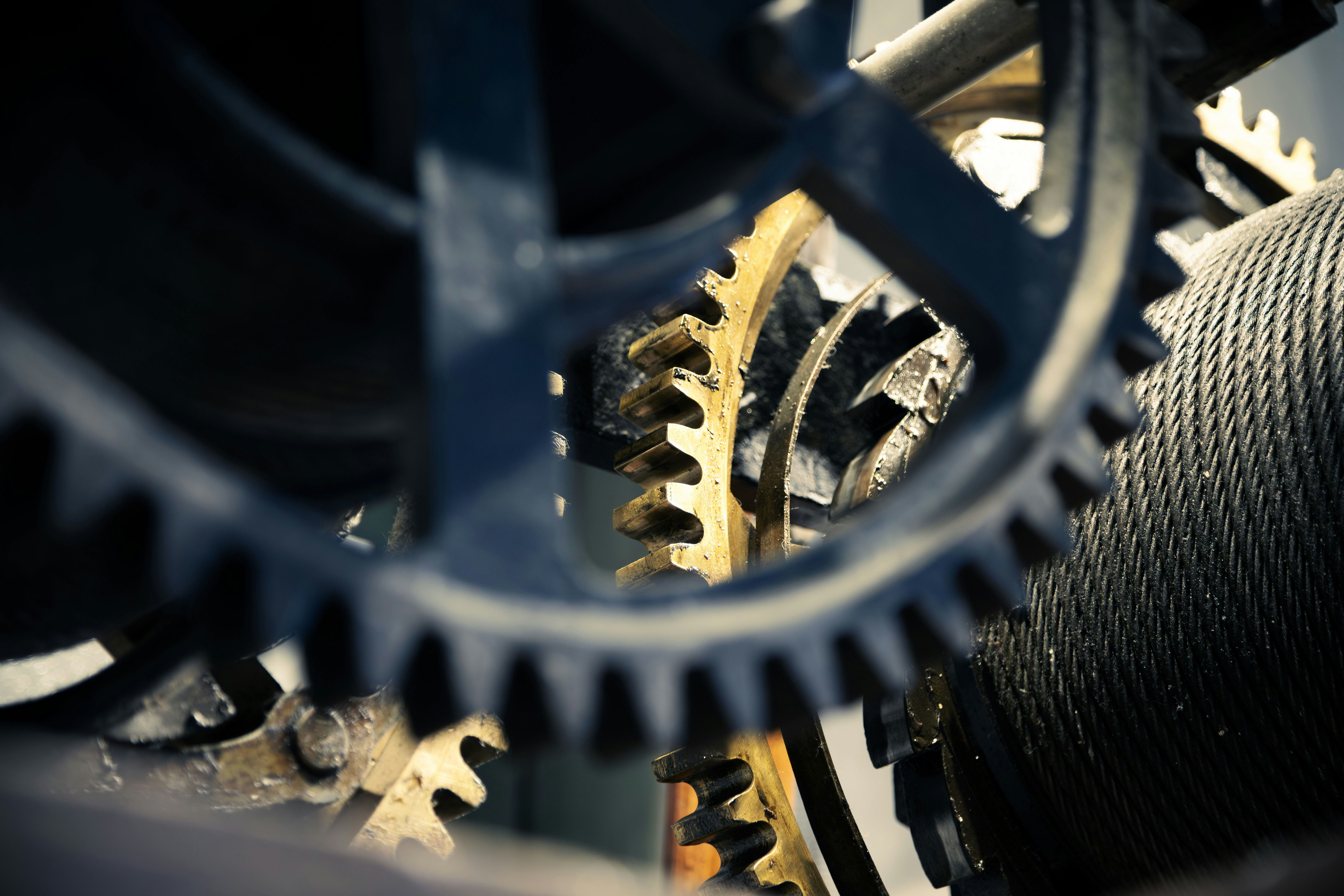 A close up of a gear wheel on a machine photo – Free Machine Image on ...