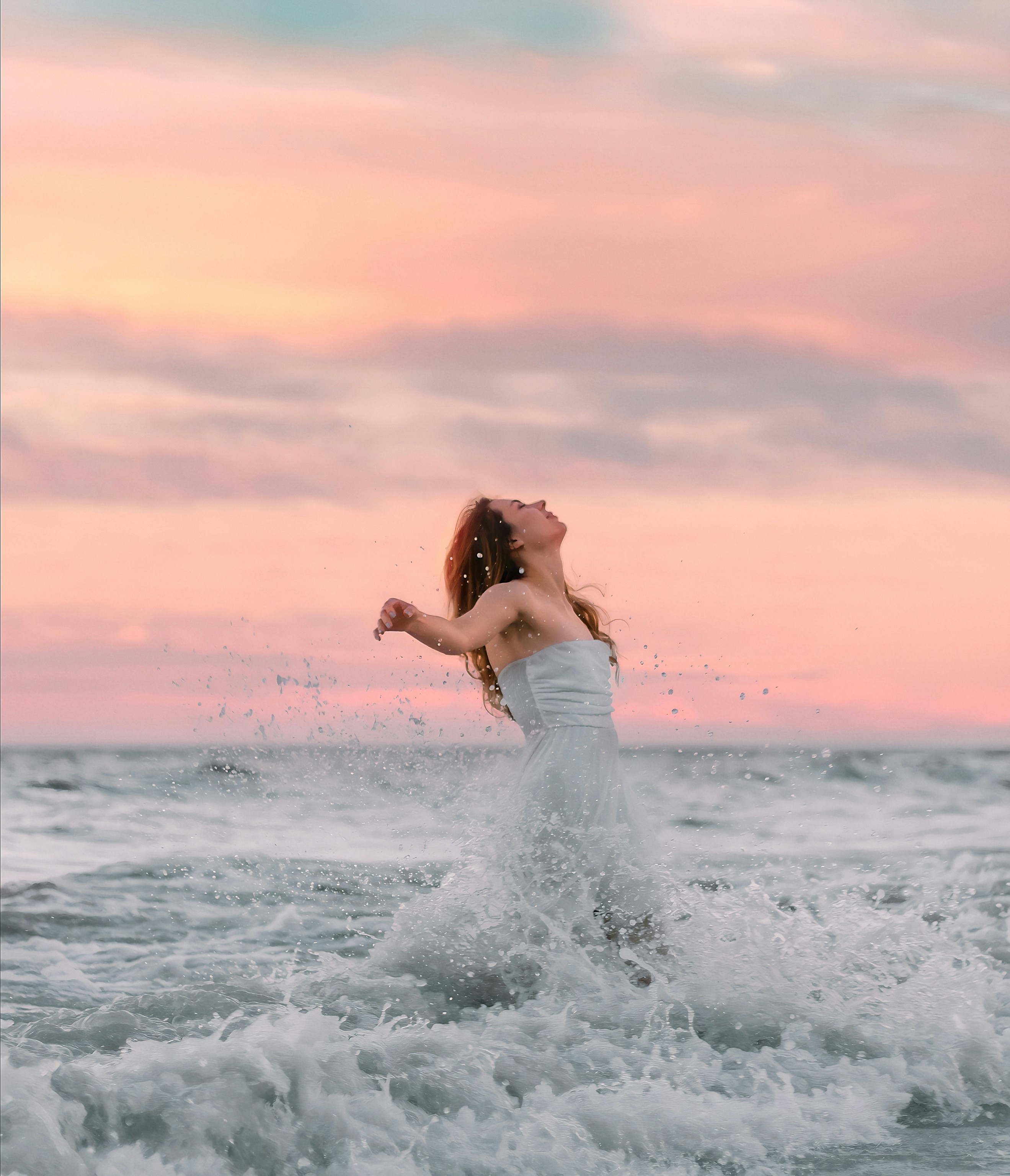 A woman in a white dress standing in the ocean photo – Free Scarborough bluffs park Image on ...