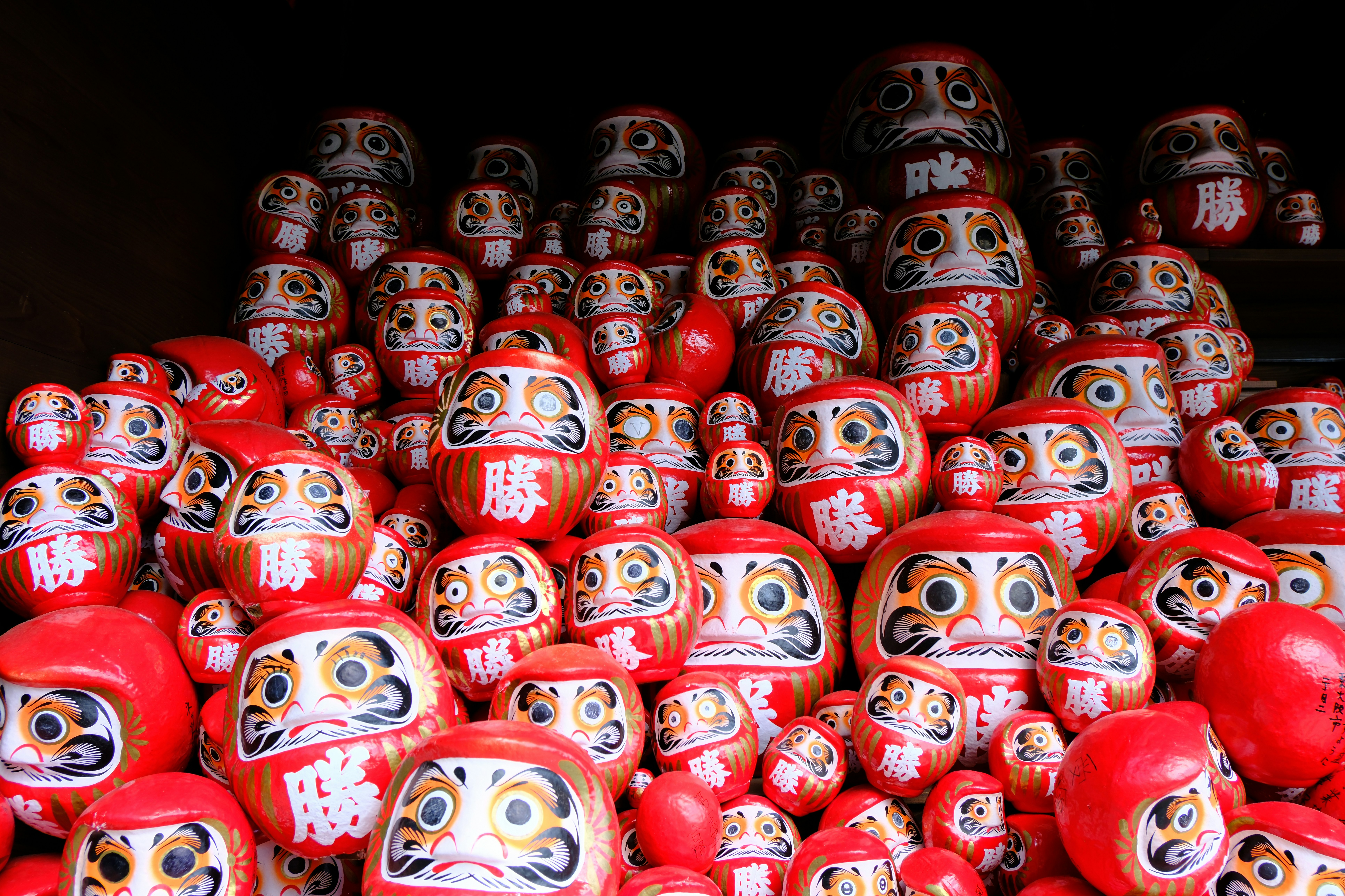 A pile of red apples with faces painted on them photo – Free Japan ...