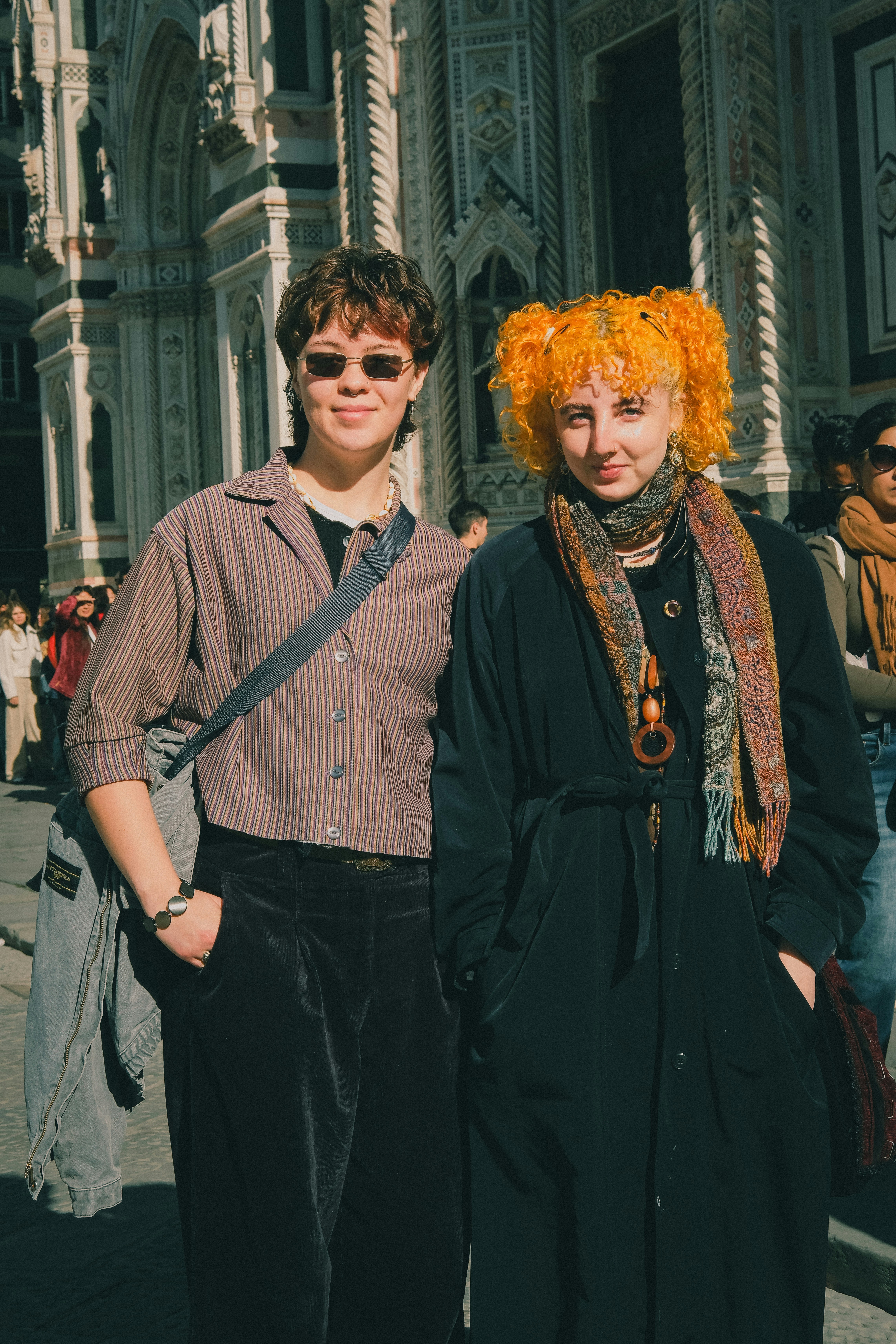 A couple of people standing next to each other photo – Free Florence ...