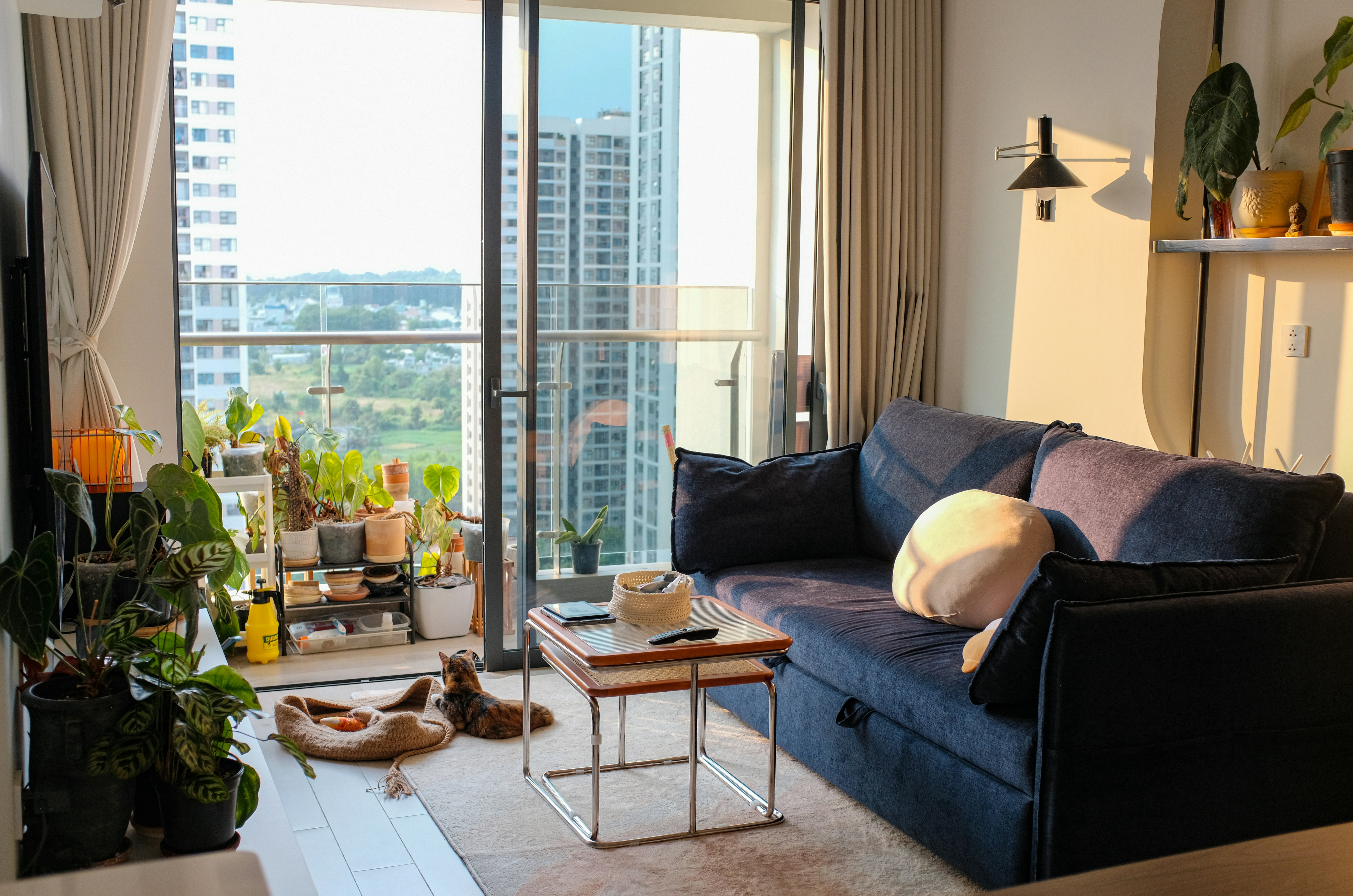A living room filled with furniture and a large window photo – Free ...