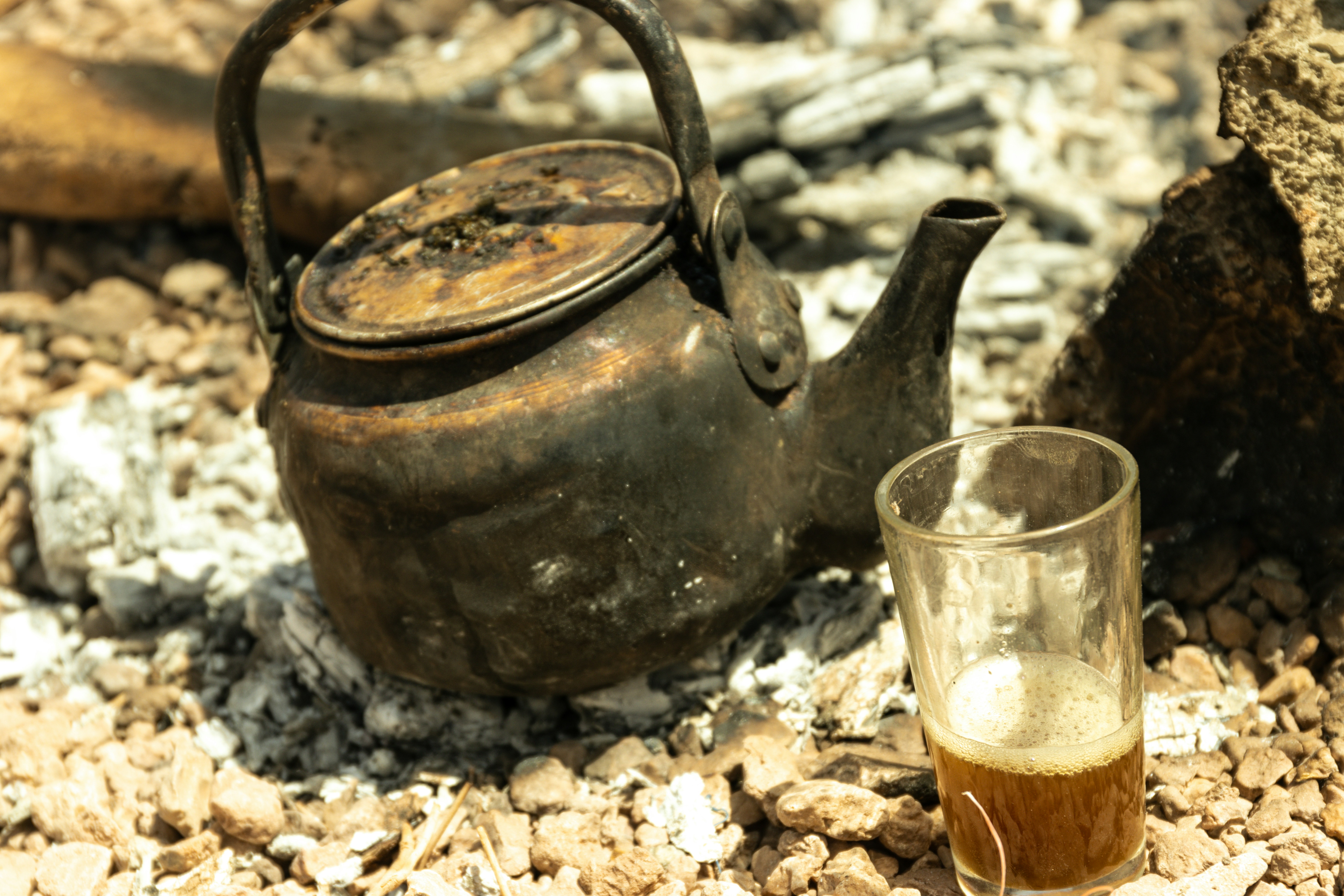 Rust and Glass in a Pebble Still Life