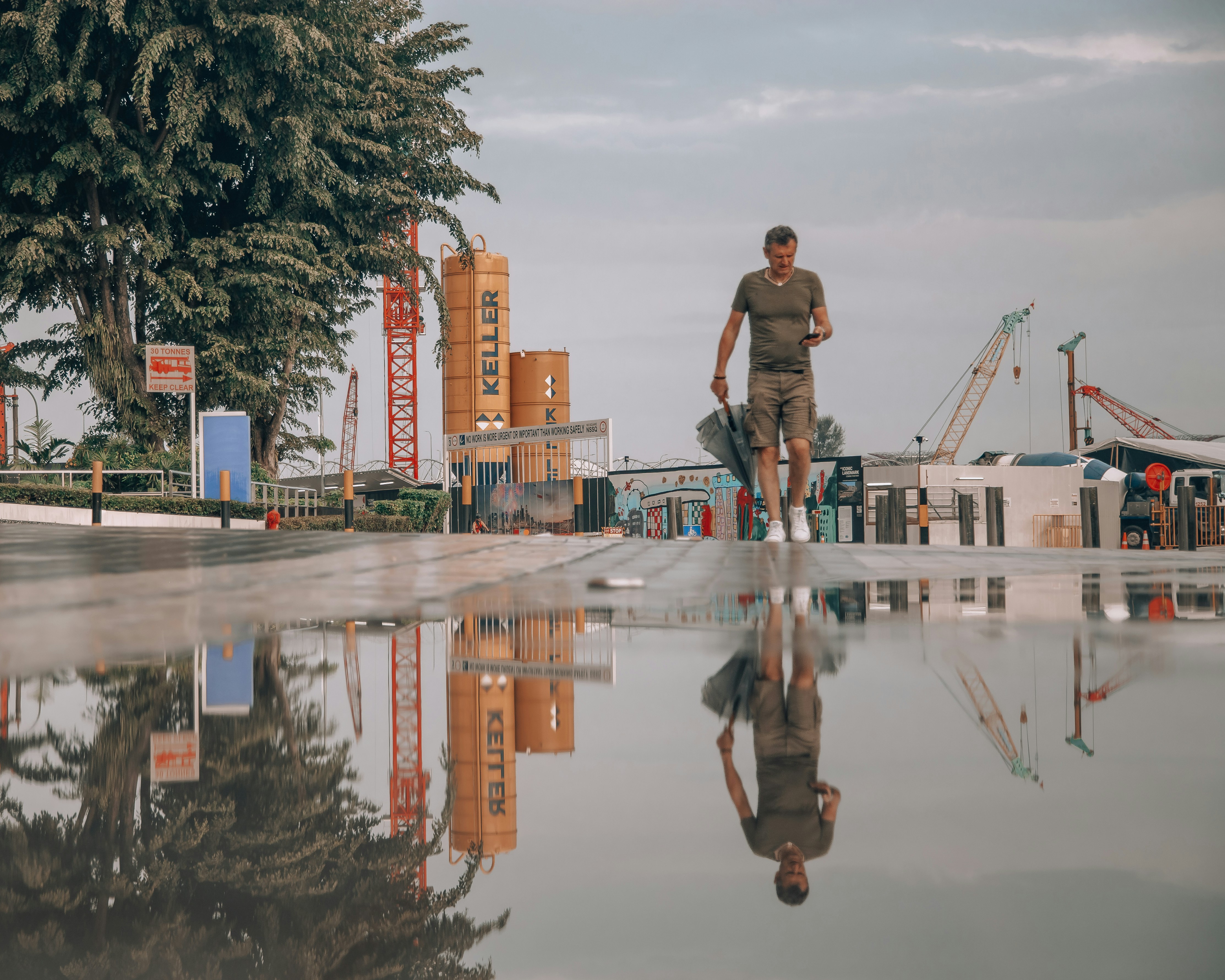 Urban Reflections: A Stroll Amidst Construction