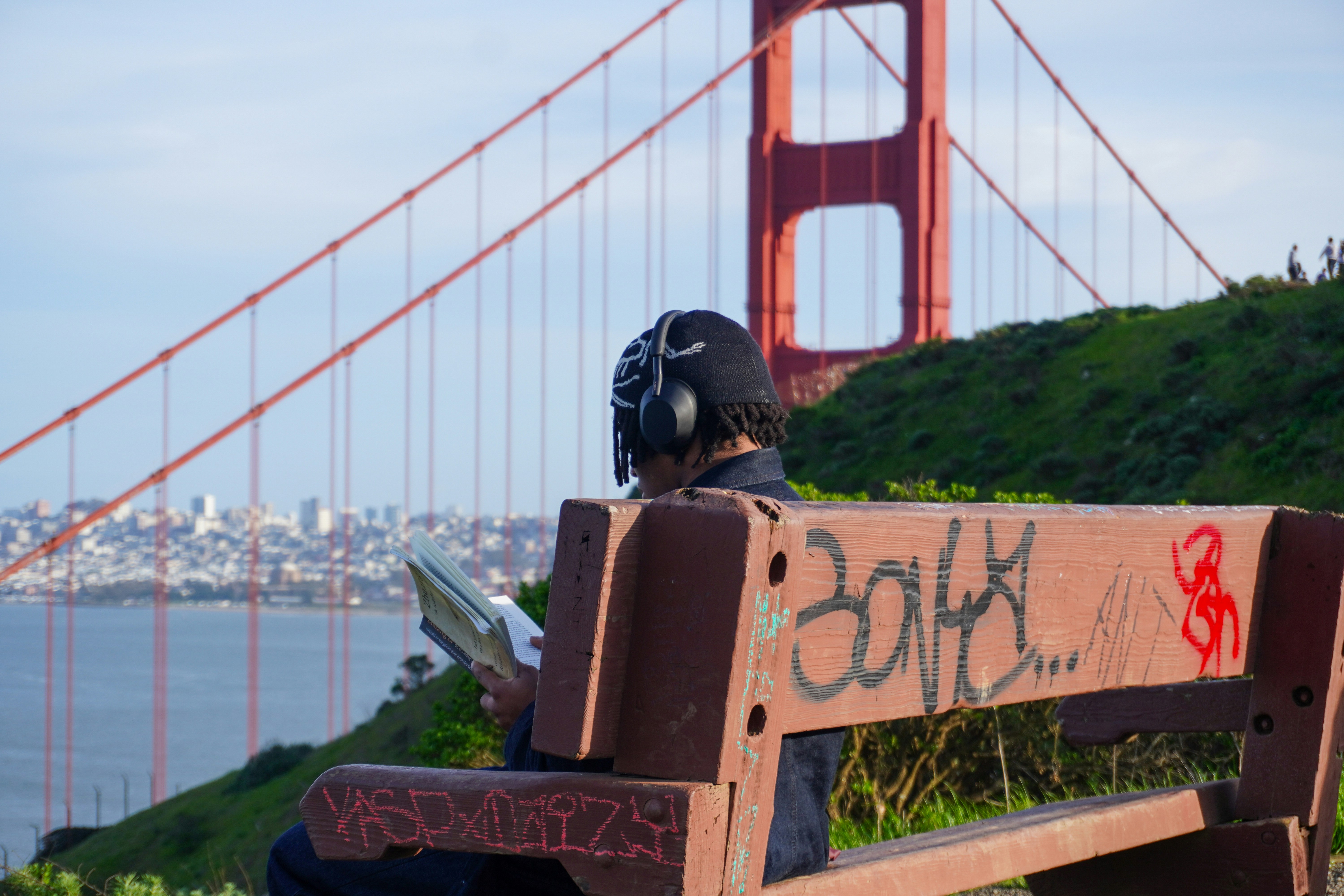 Map Scout at the Graffiti Bench Beneath the Golden Gate