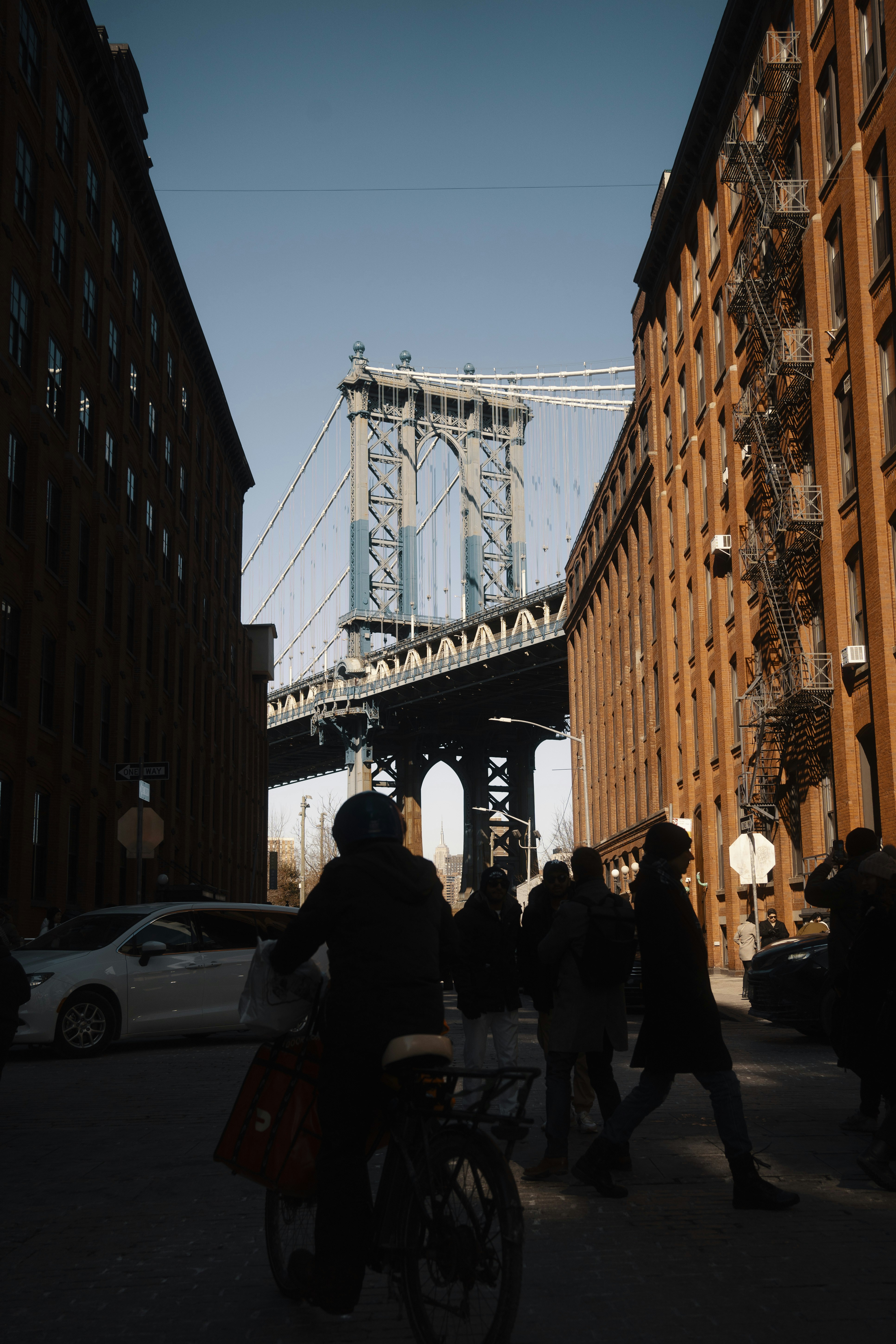 Bridge Between Brick Canvases: Pedestrians and Skyline
