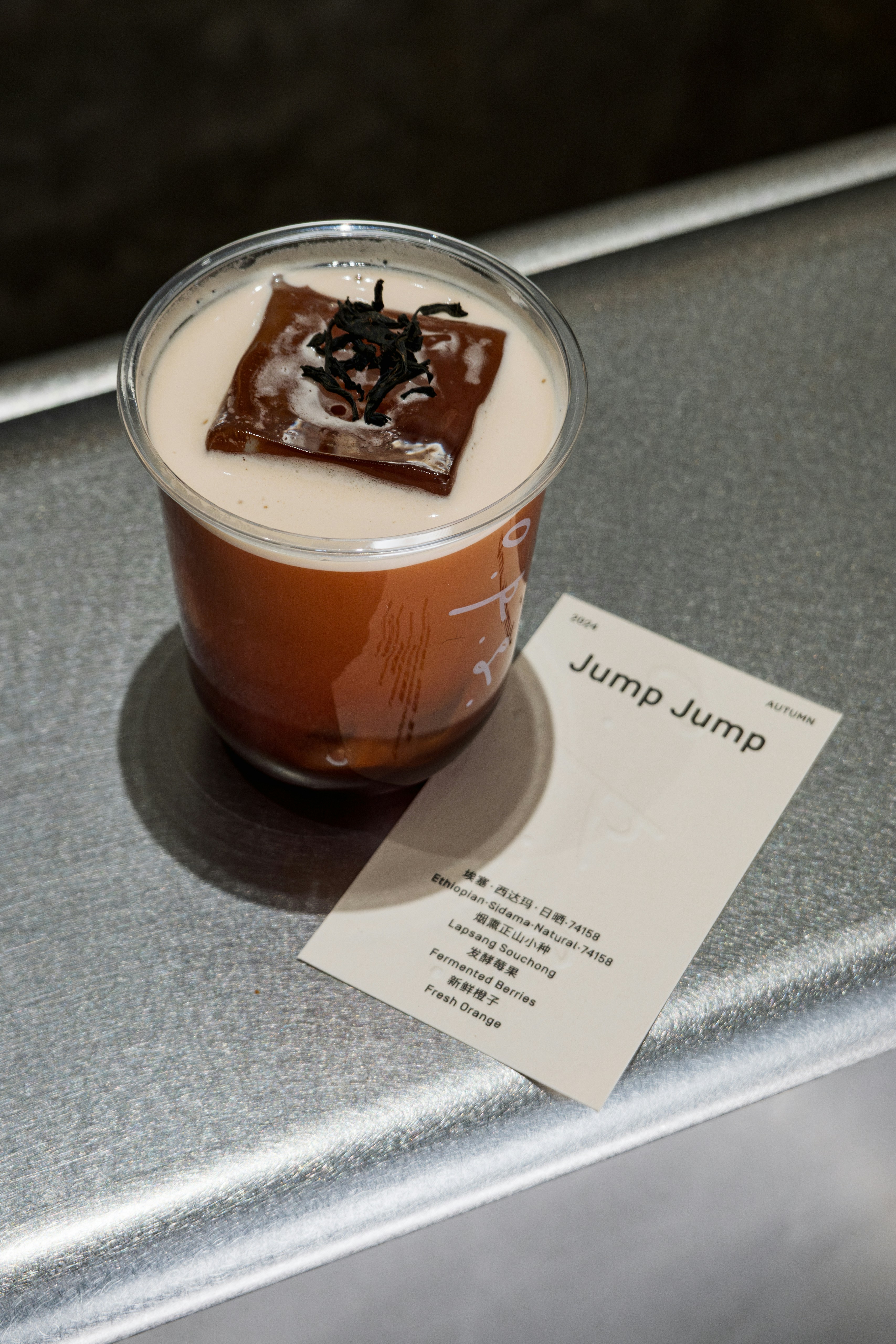 Glass of Brew and a Card: Quiet Moment at the Counter