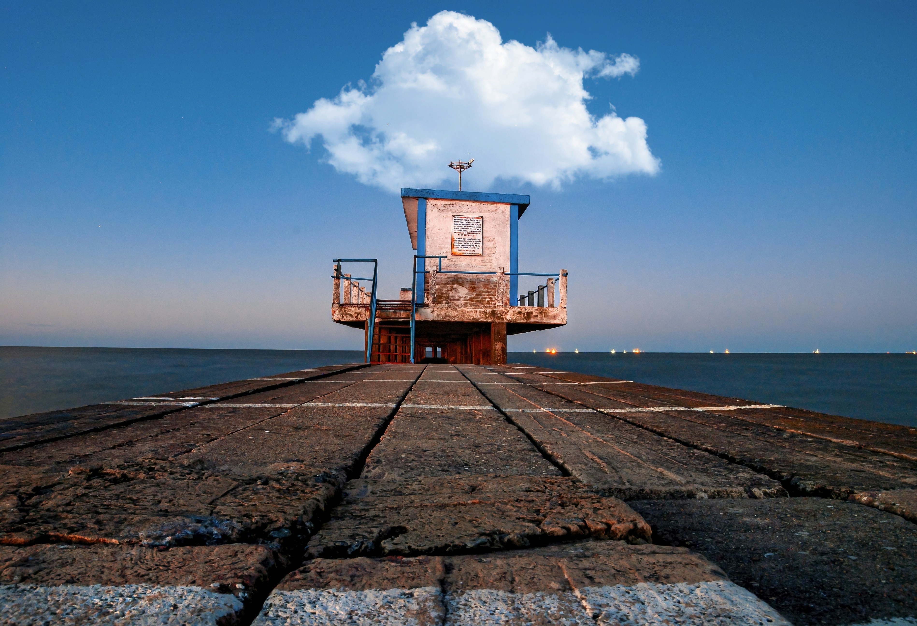 Cloud-Kissed Pier Perspective