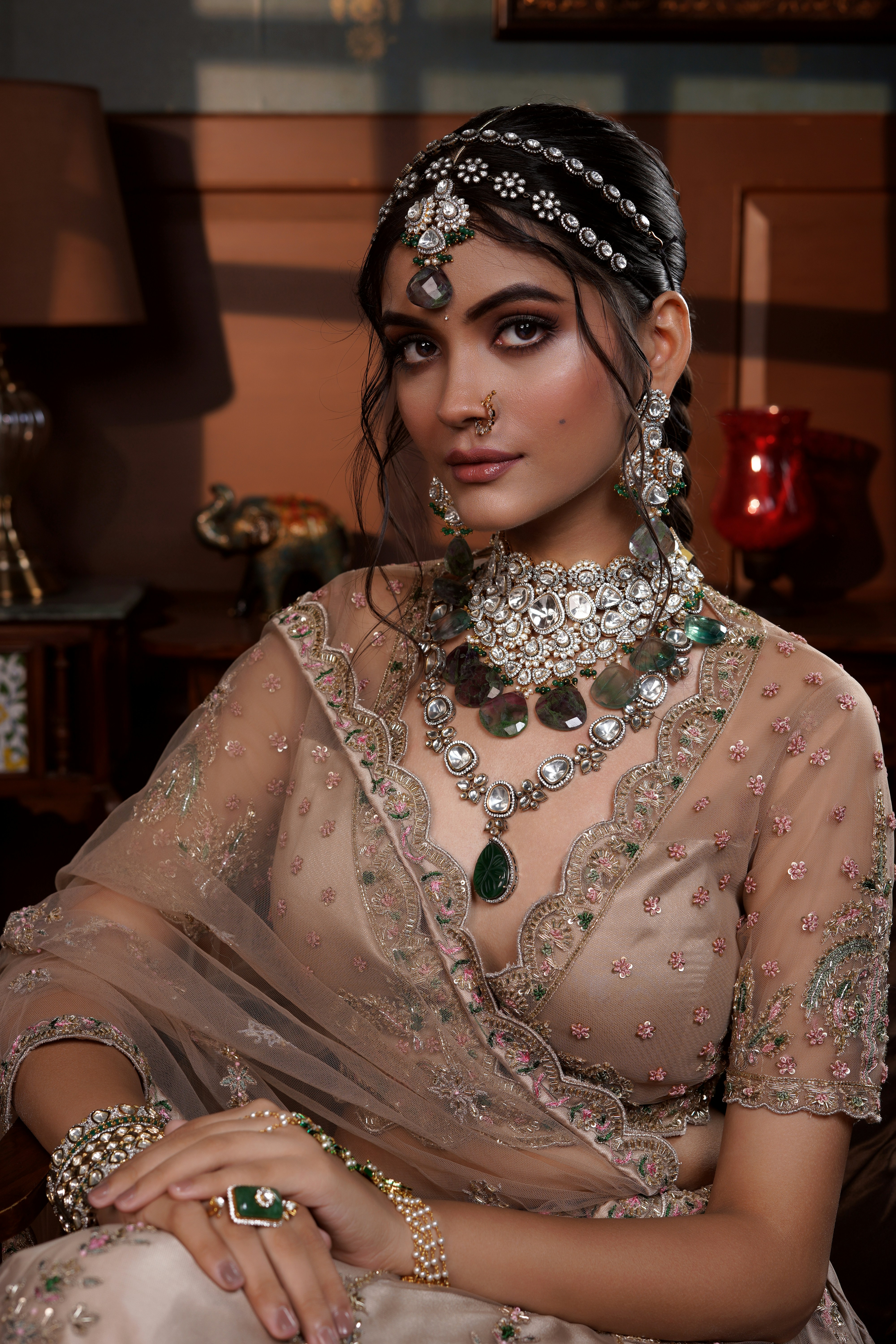 A woman in a bridal outfit sitting on a couch photo – Free Indian girl ...