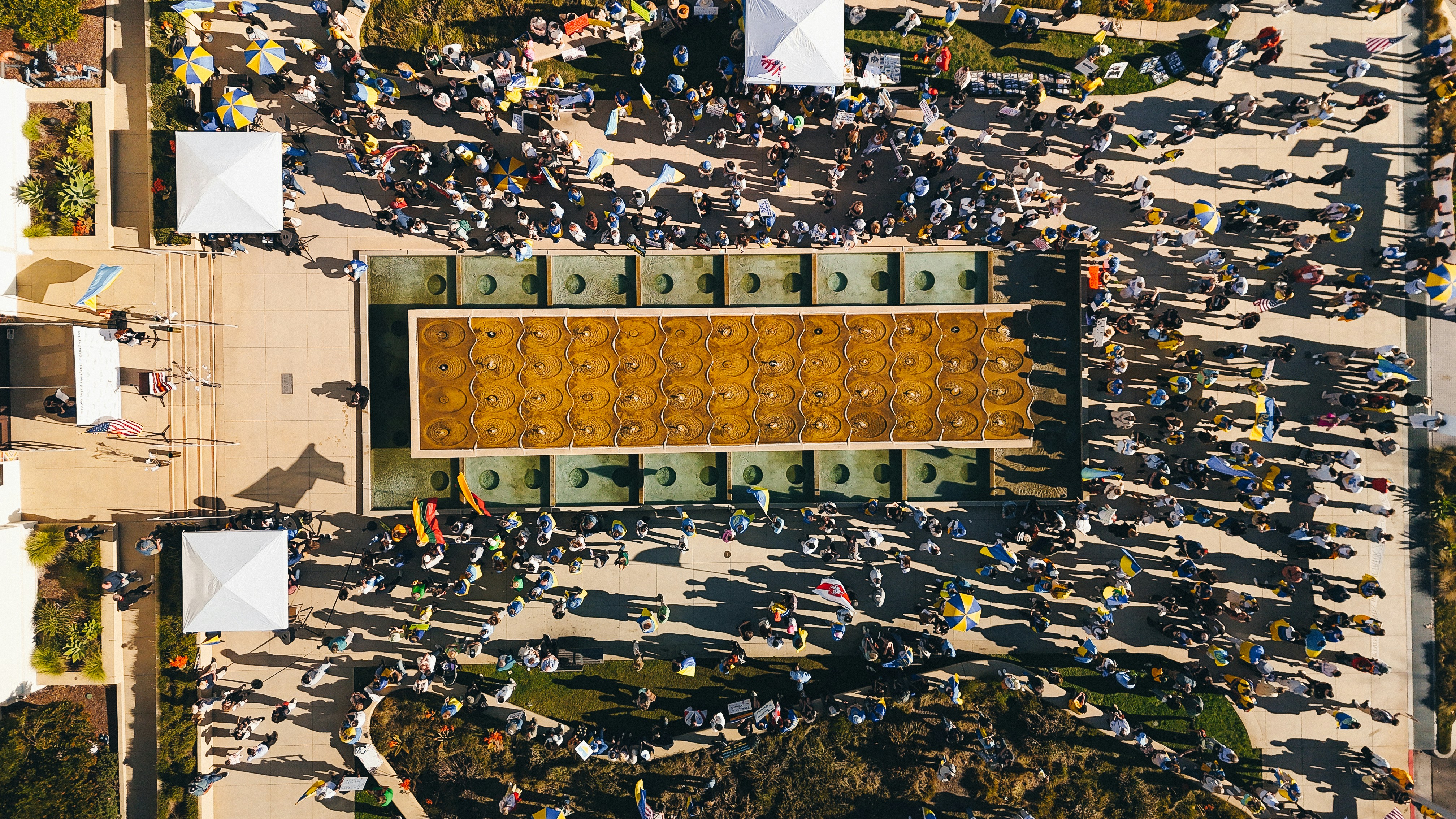 A powerful moment at Santa Monica Pier Ukrainians and supporters march for justice, holding signs that demand action against war crimes.