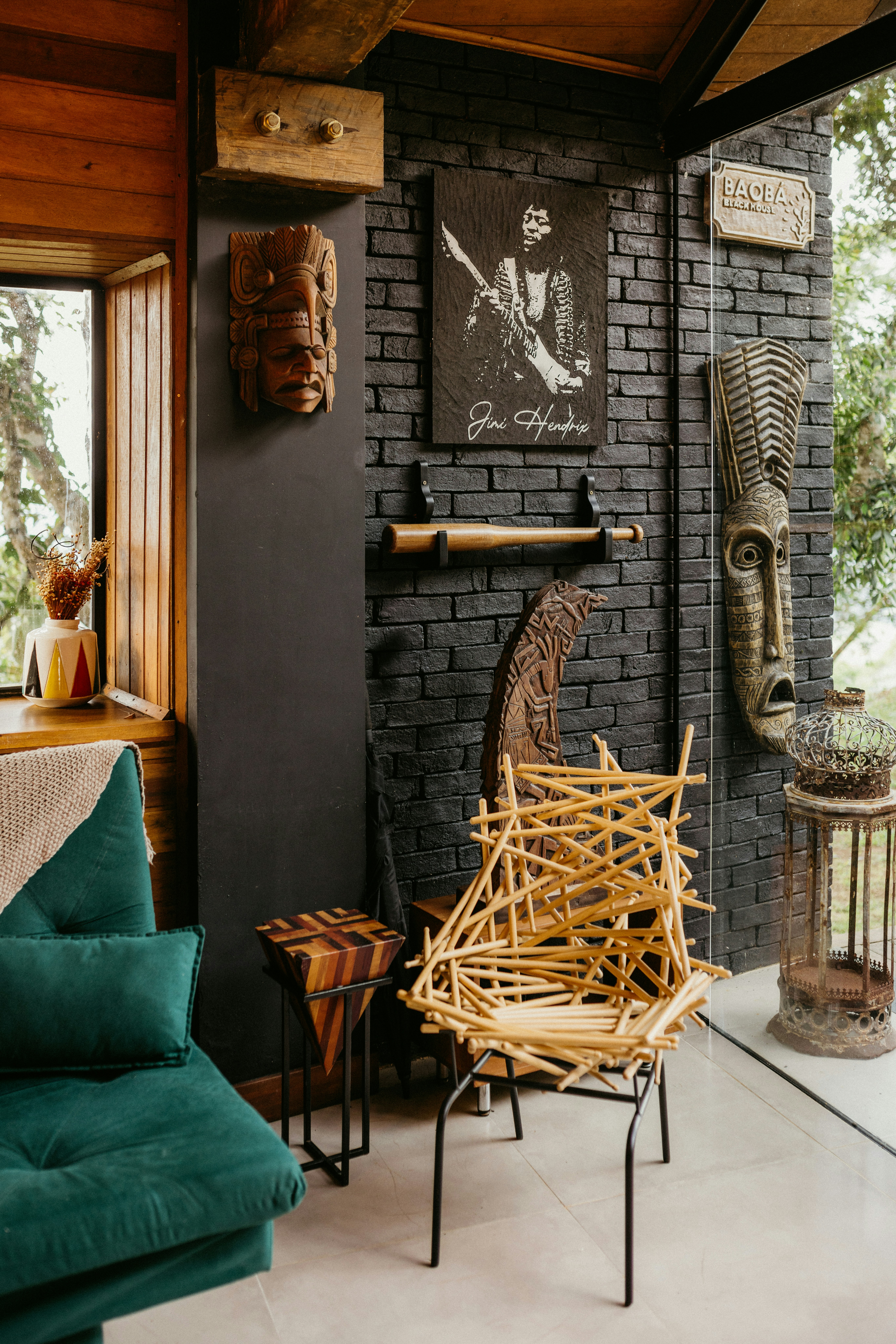 Interlaced Centerpiece: A Wicker Chair Anchors a Brick-Walled Nook