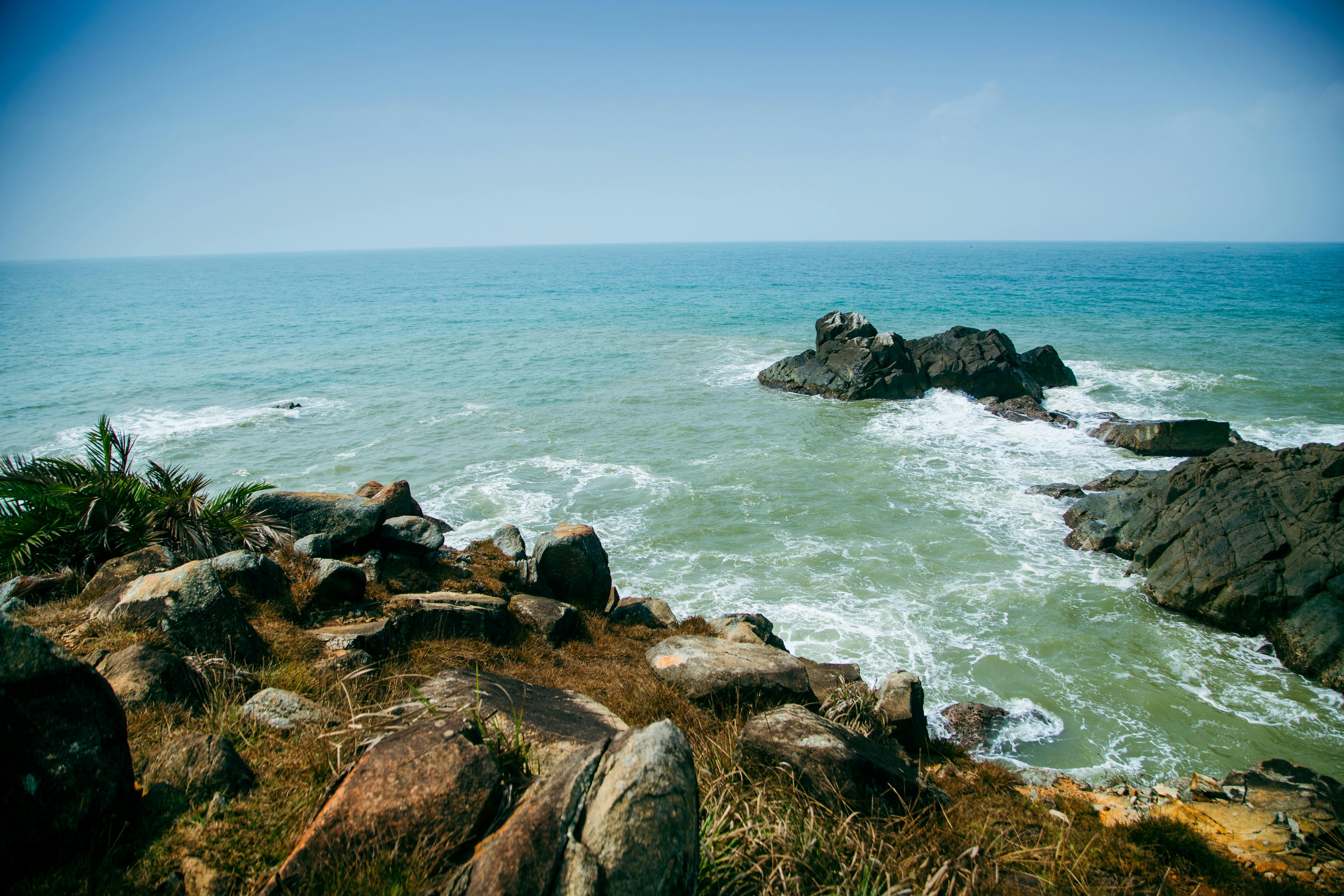 A view of the ocean from a cliff photo – Free Cape three points Image ...
