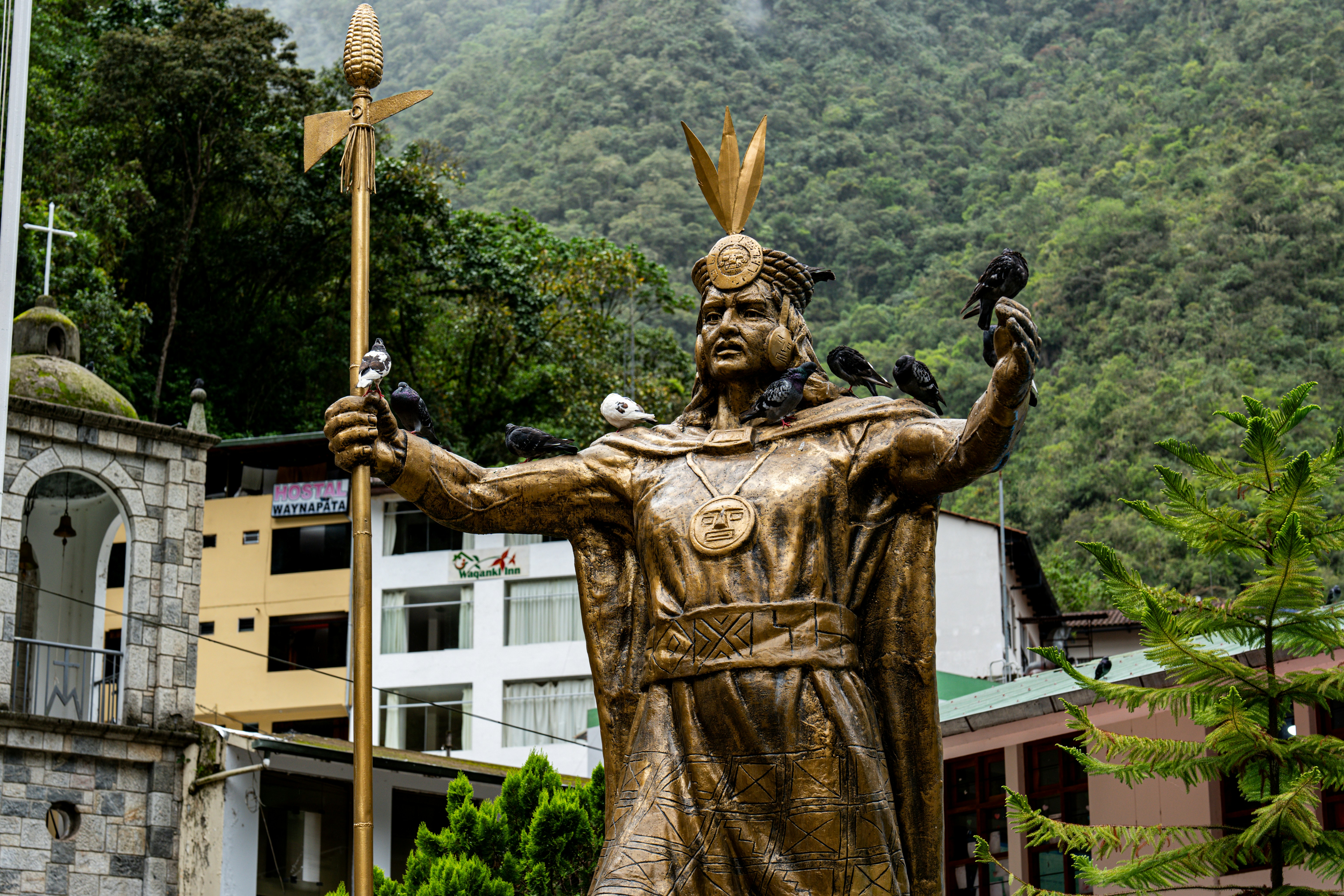 A statue of a man with a crown on his head