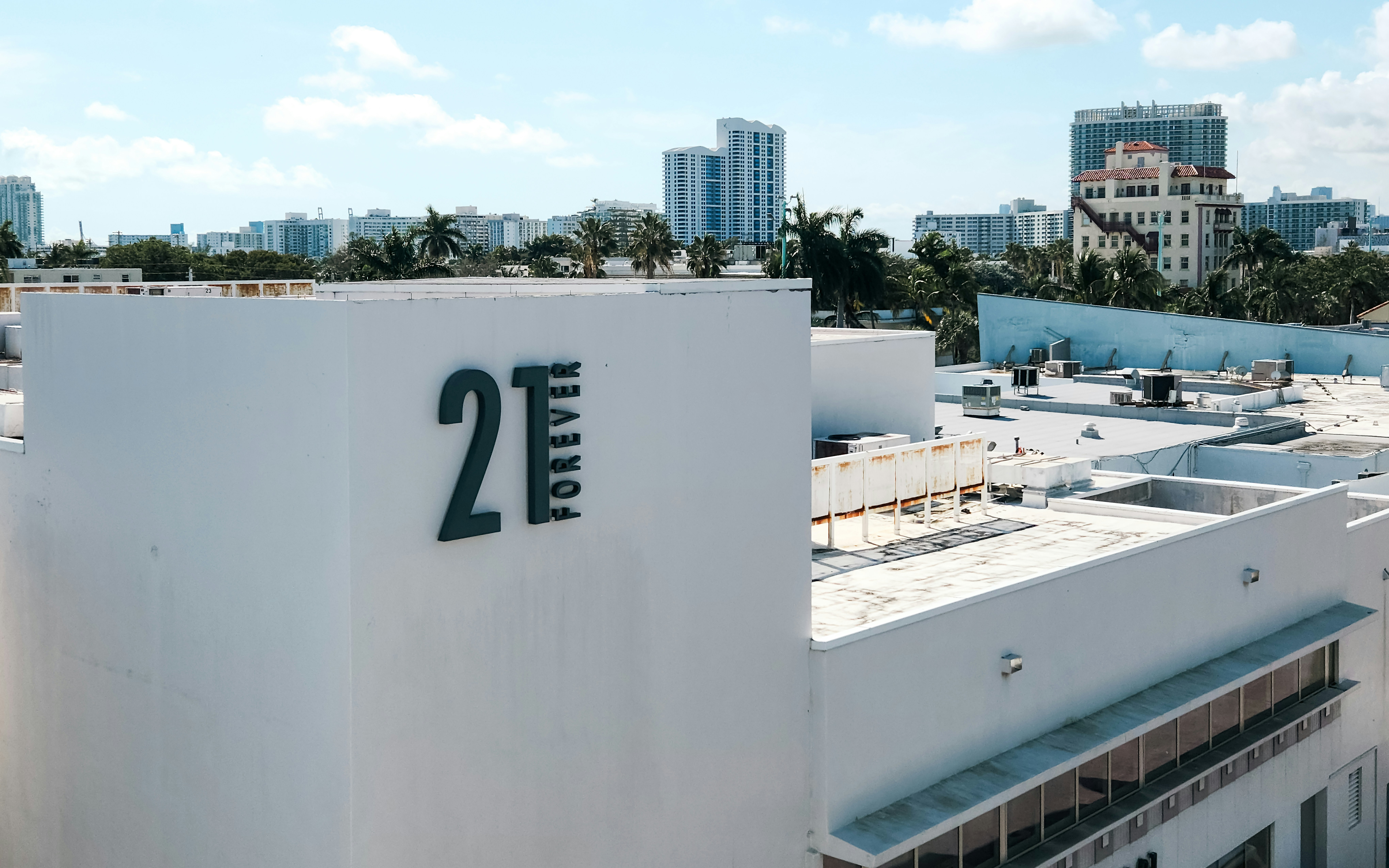 Rooftop view of Forever 21 in Miami Beach with surrounding cityscape under a clear blue sky.