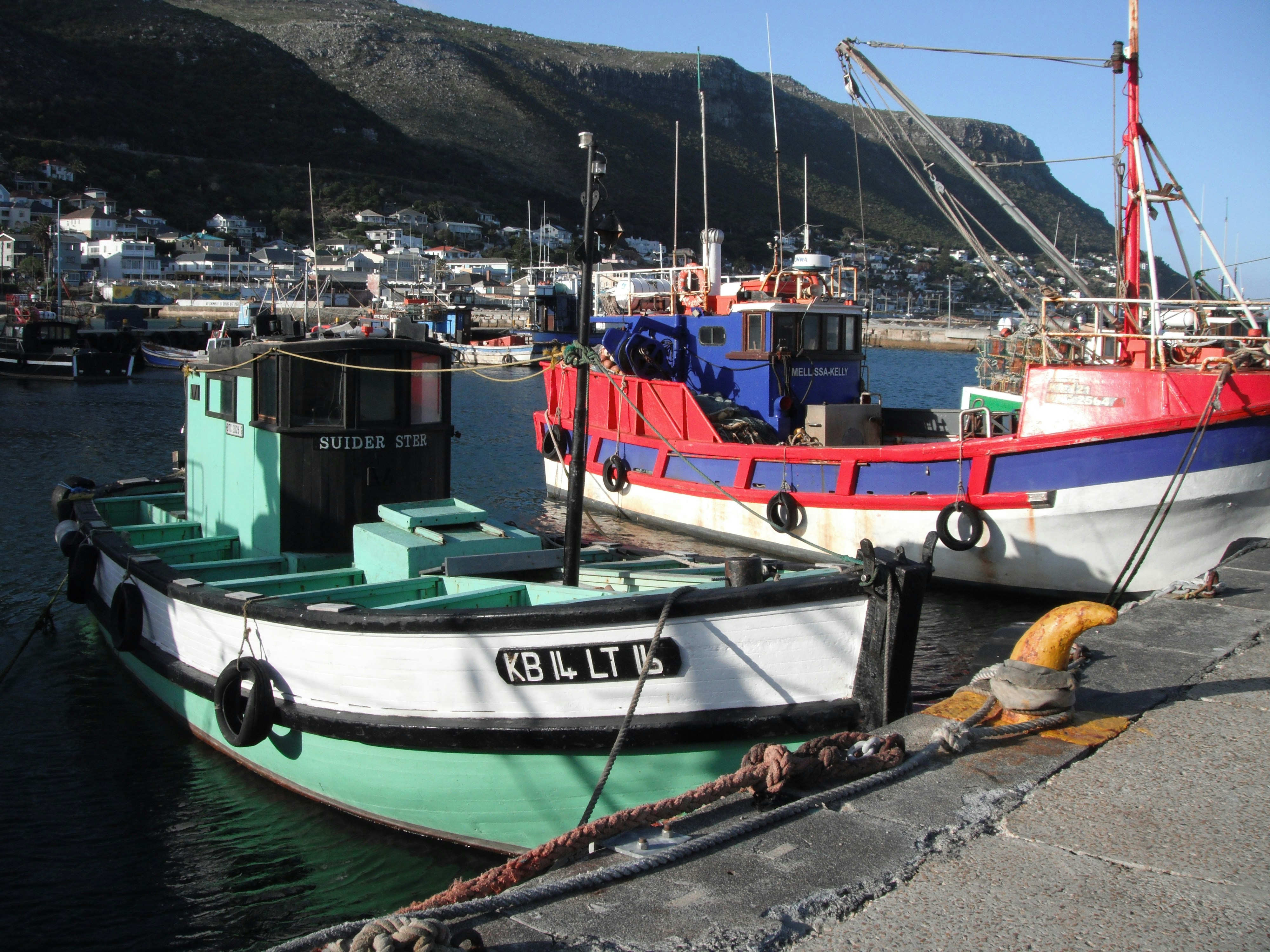 Color-Blocked Trawler Fleet at the Quay