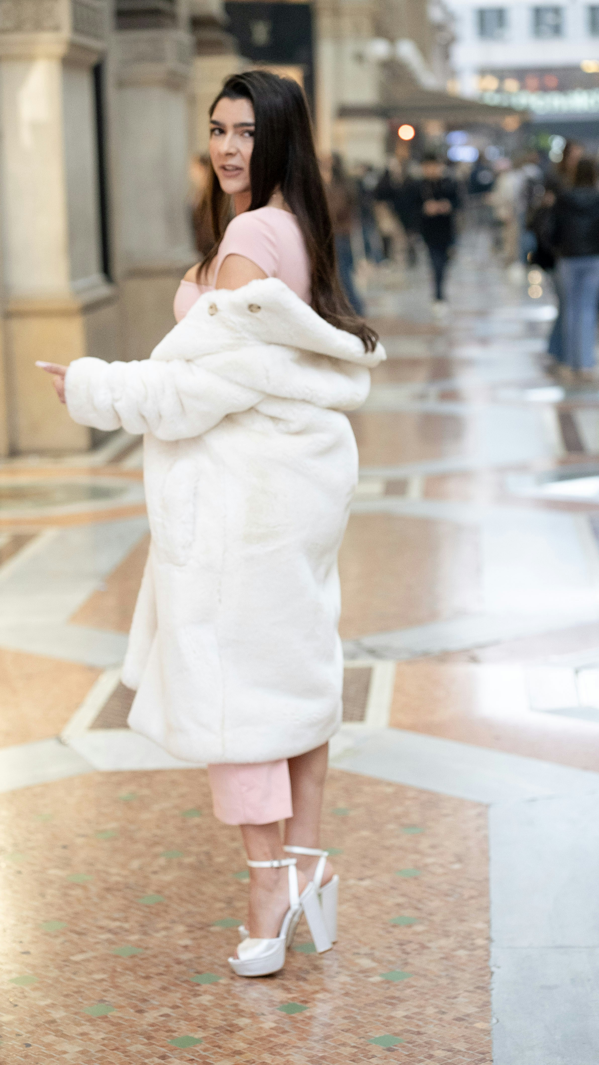 Marble-Glow Moment: Pink Silhouette in a White Fur Coat