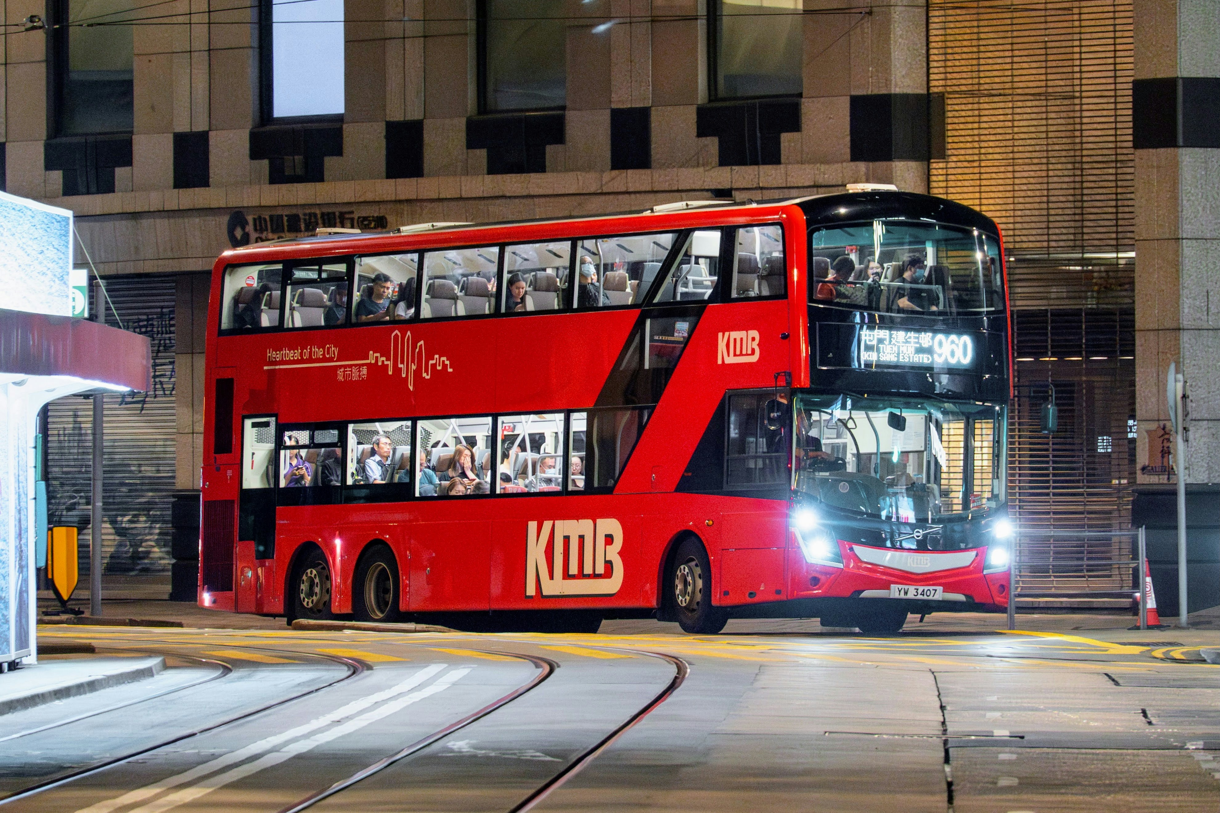 Vibrant Night Journey: The Red Double-Decker