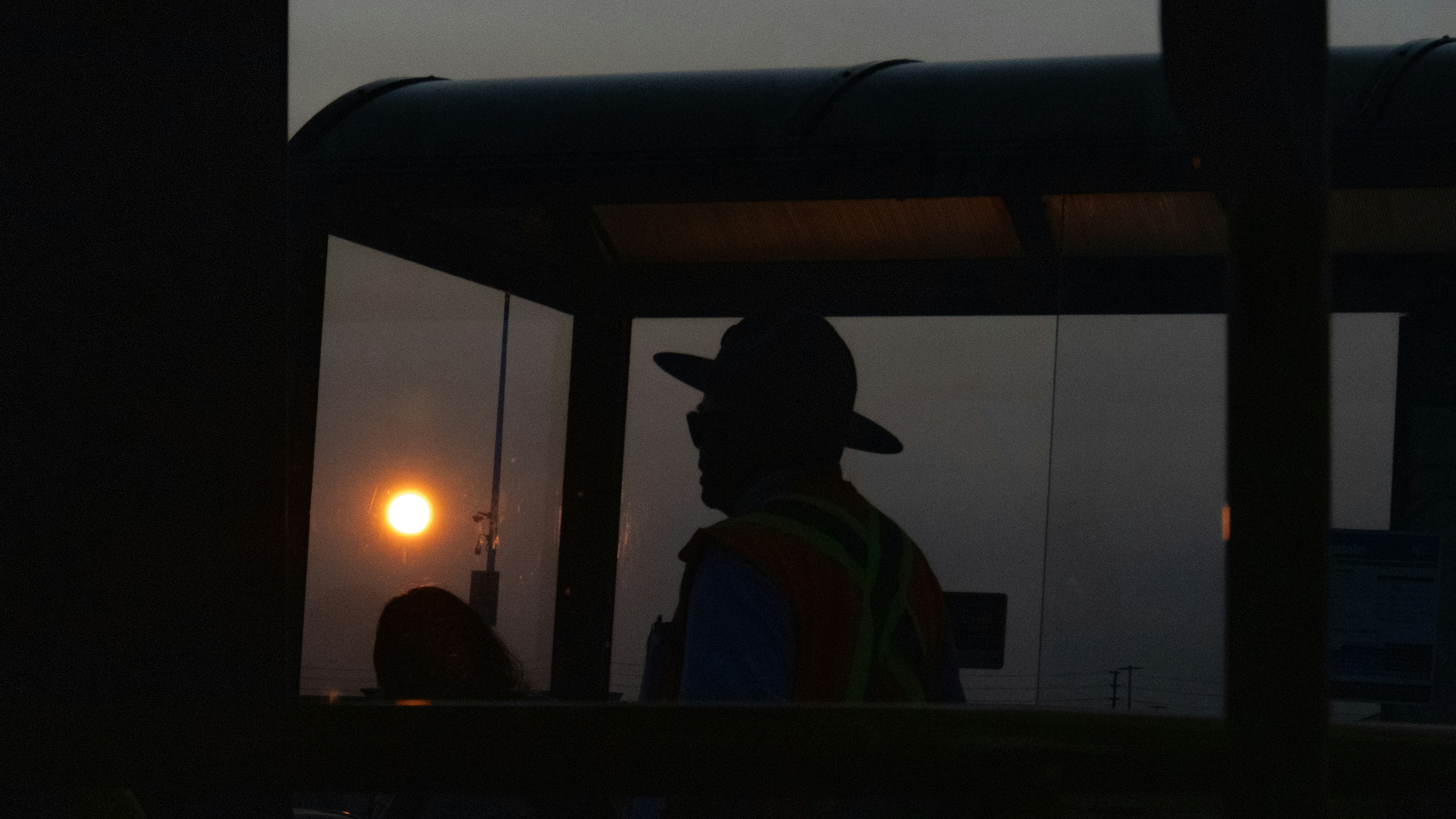 A man in a cowboy hat standing in front of a bus photo – Free Vaughan ...
