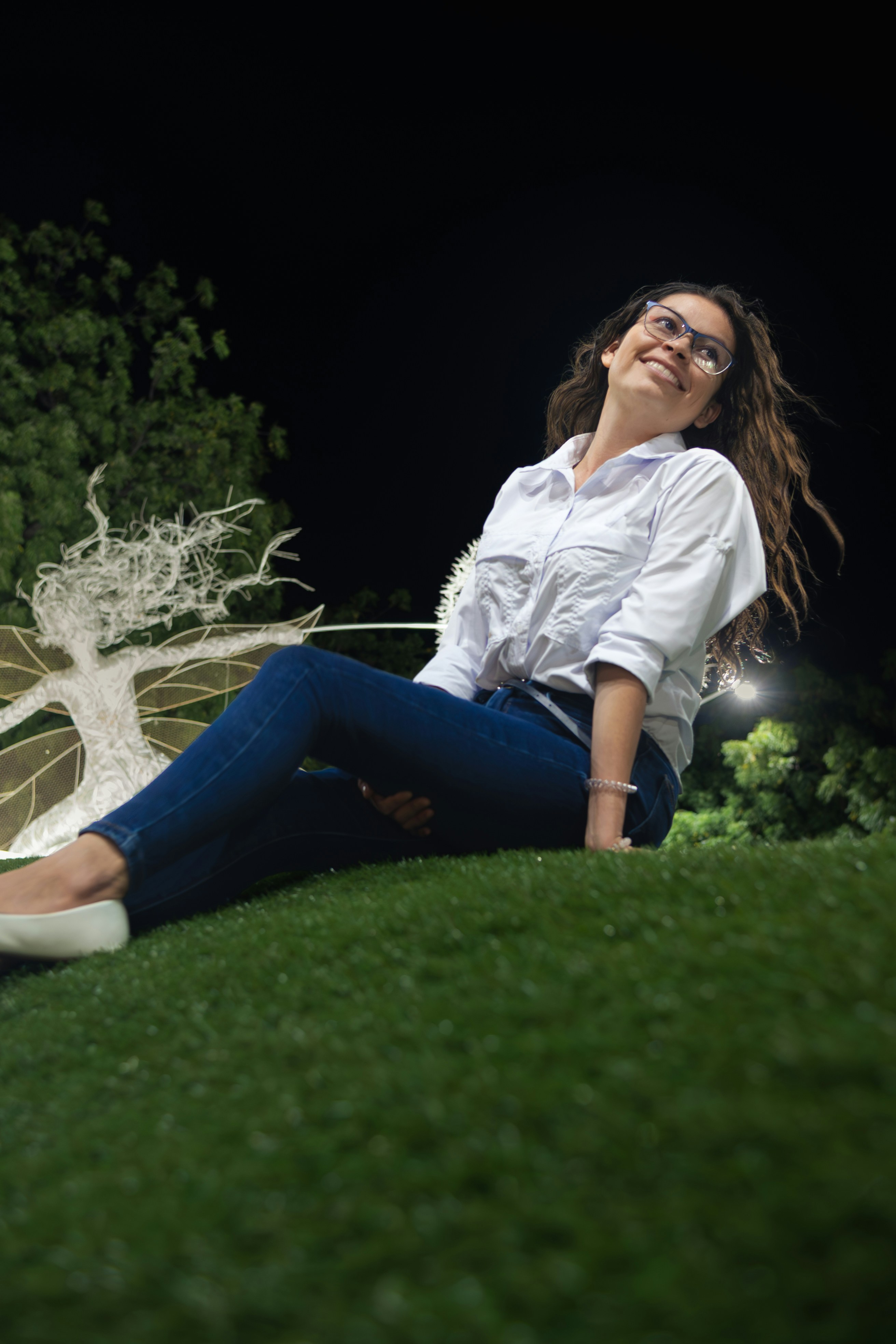 Moonlit Grin on the Grass: A Night Portrait by Park Light