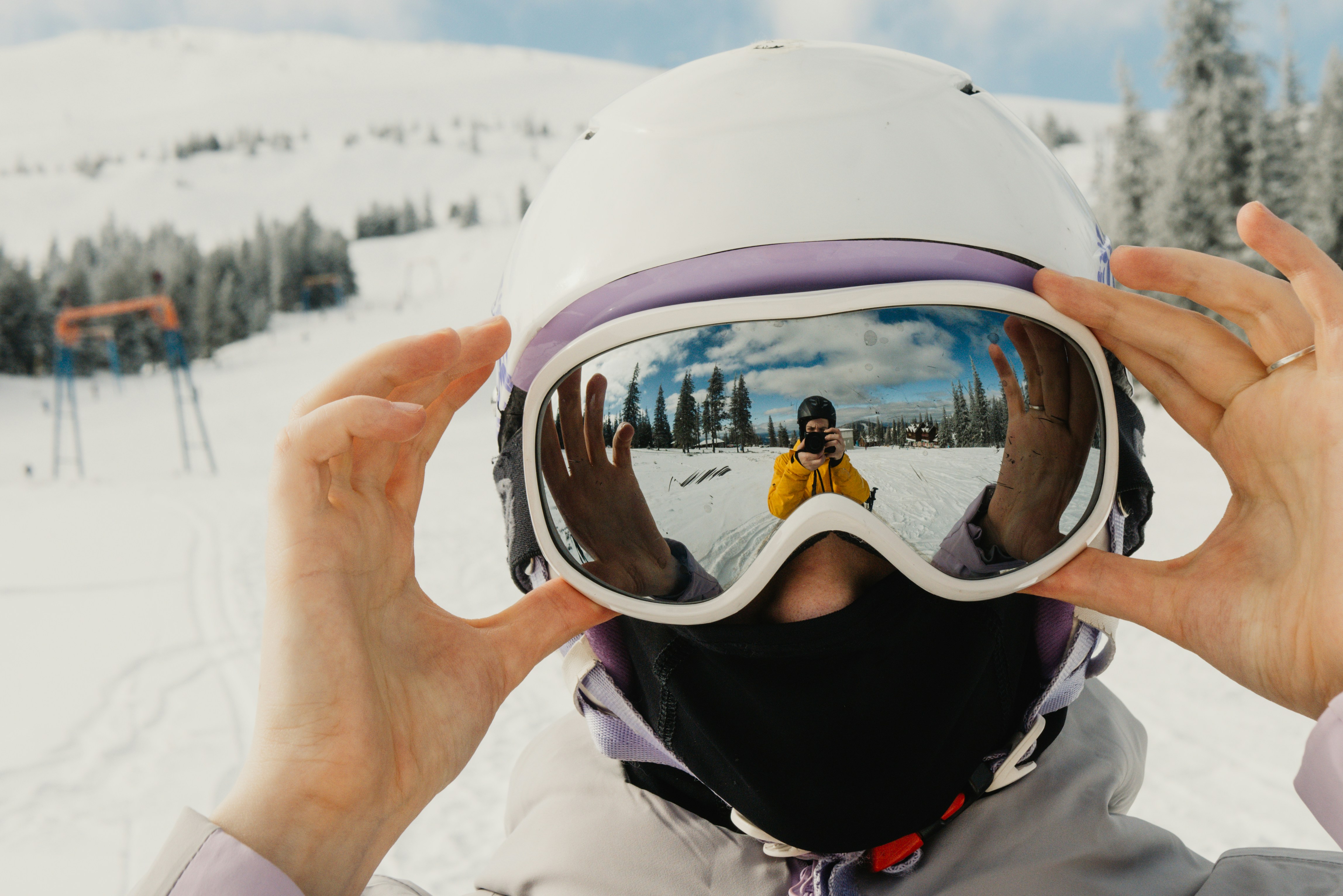 A person wearing ski goggles and a white helmet photo – Free Dragobrat ...