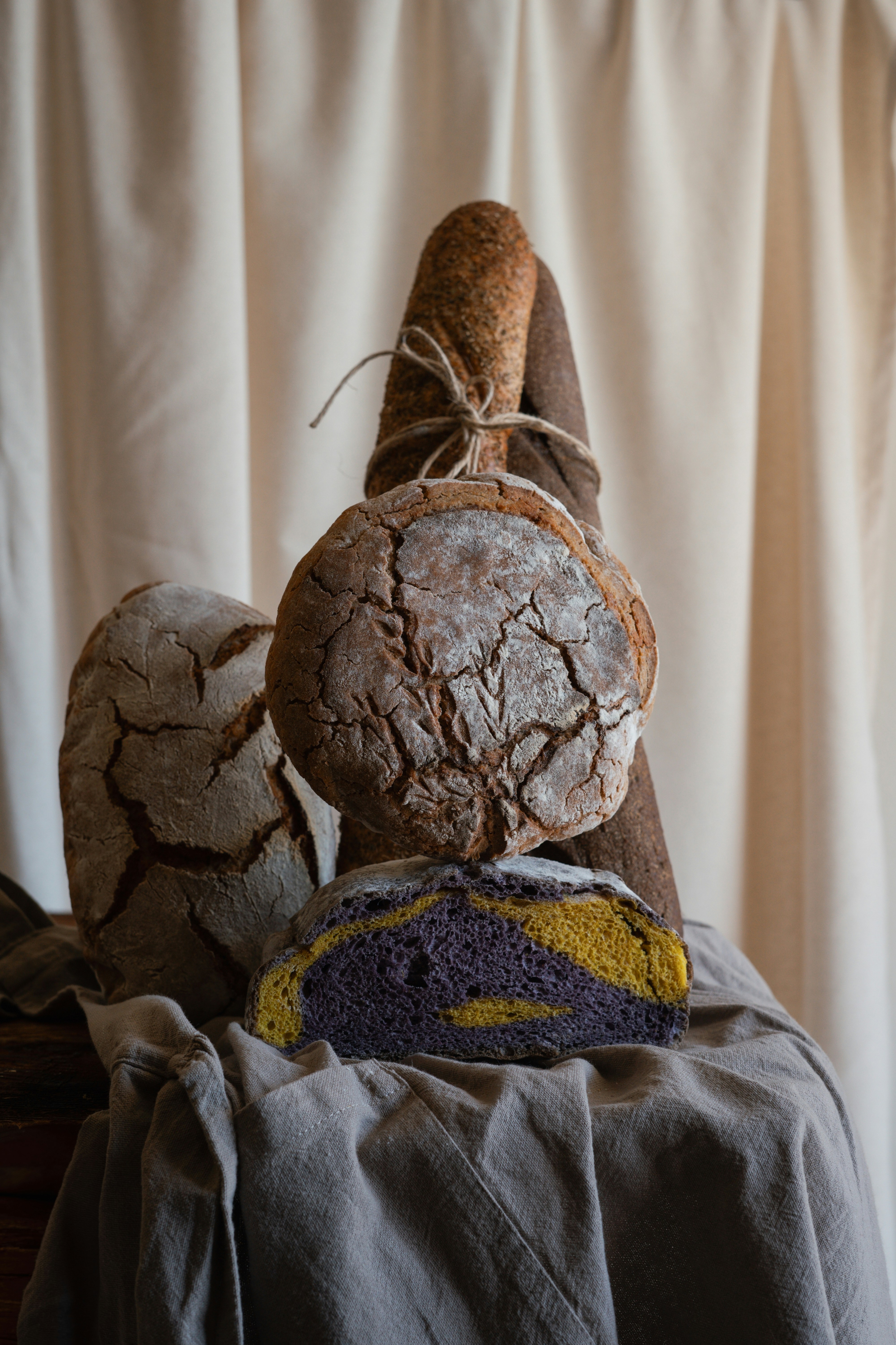 Bread Sculpture in Quiet Studio with Curved Loaves