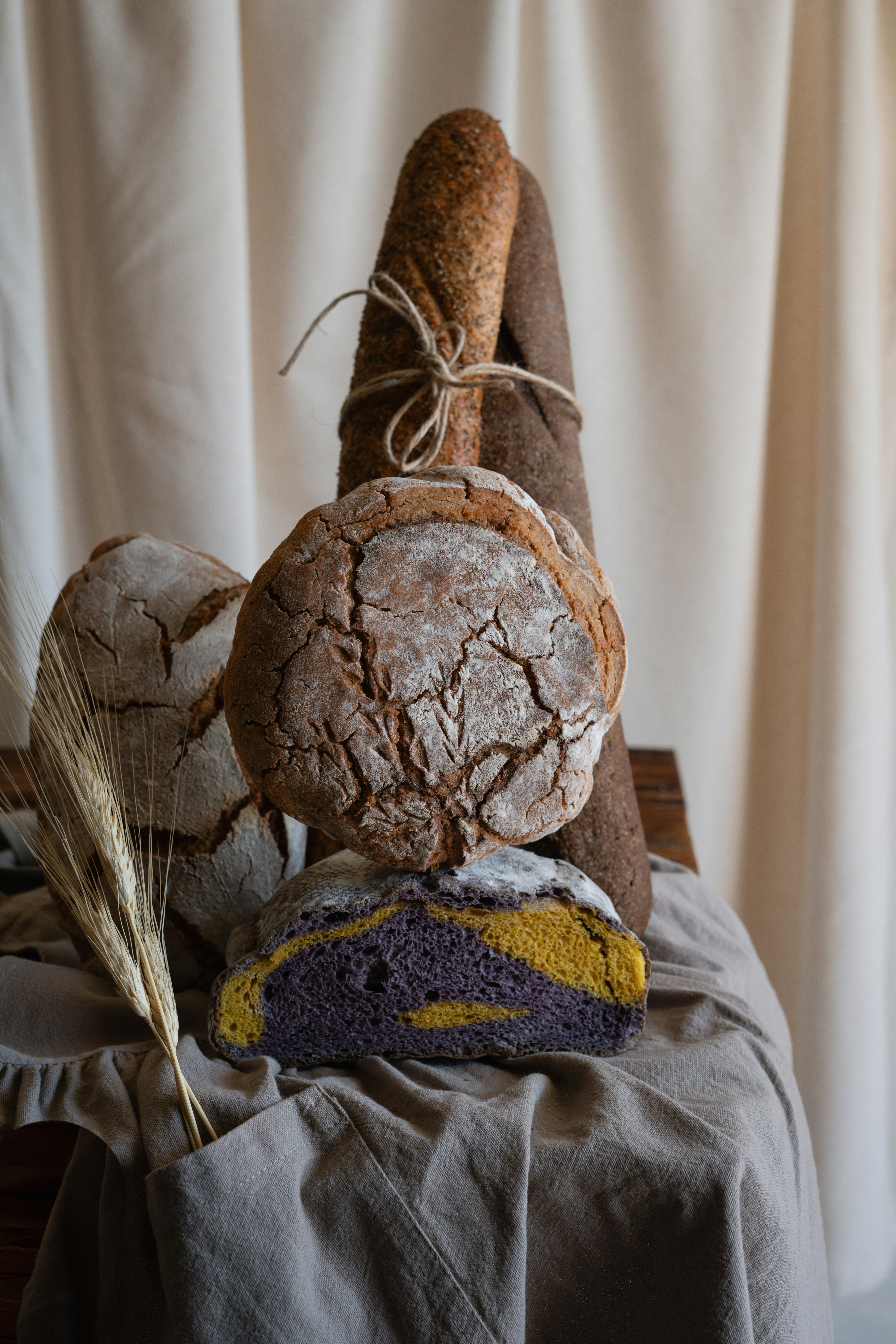 Cracked crusts and color-kissed loafs: a rustic bread still life