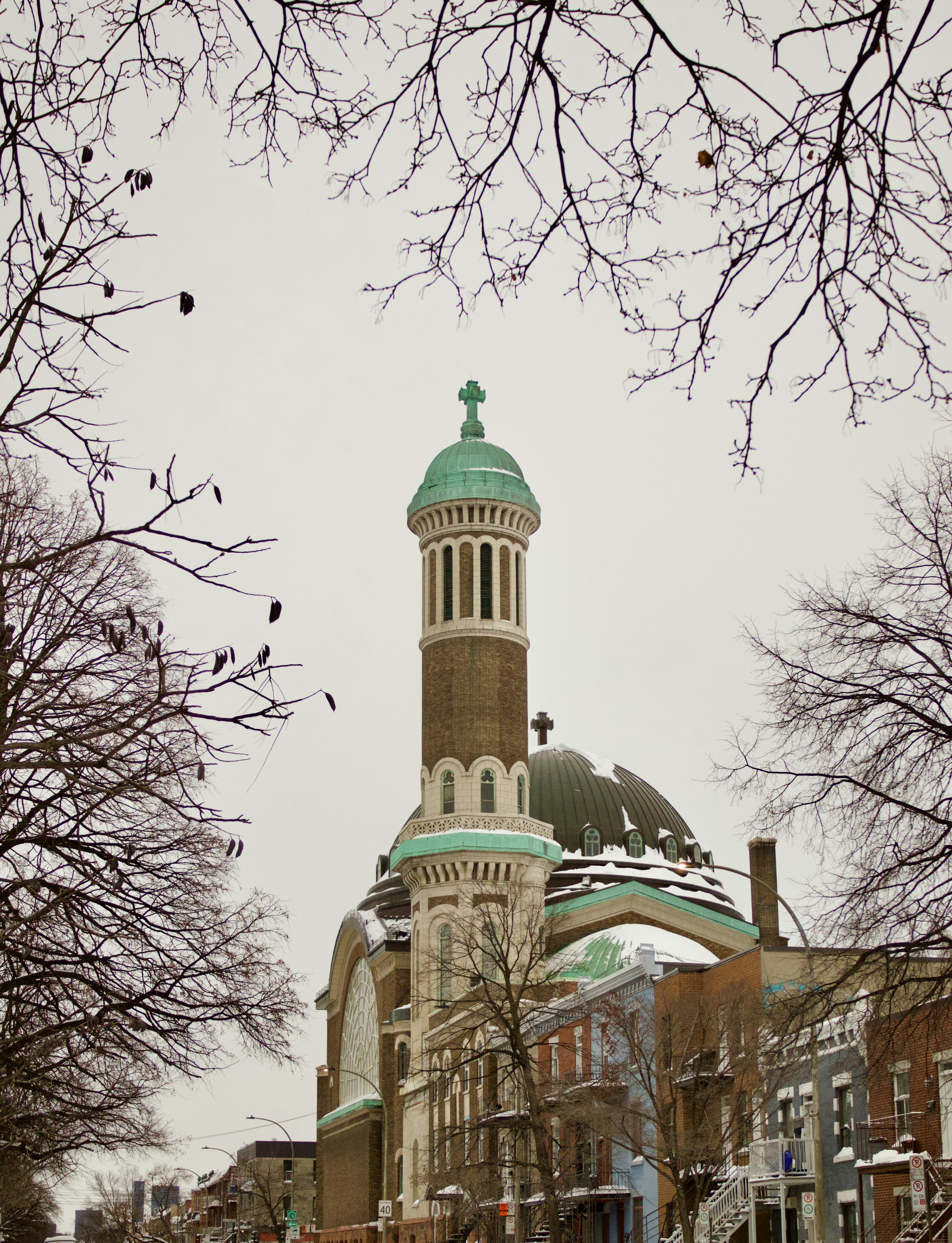 Urban Spire Amid Winter's Embrace