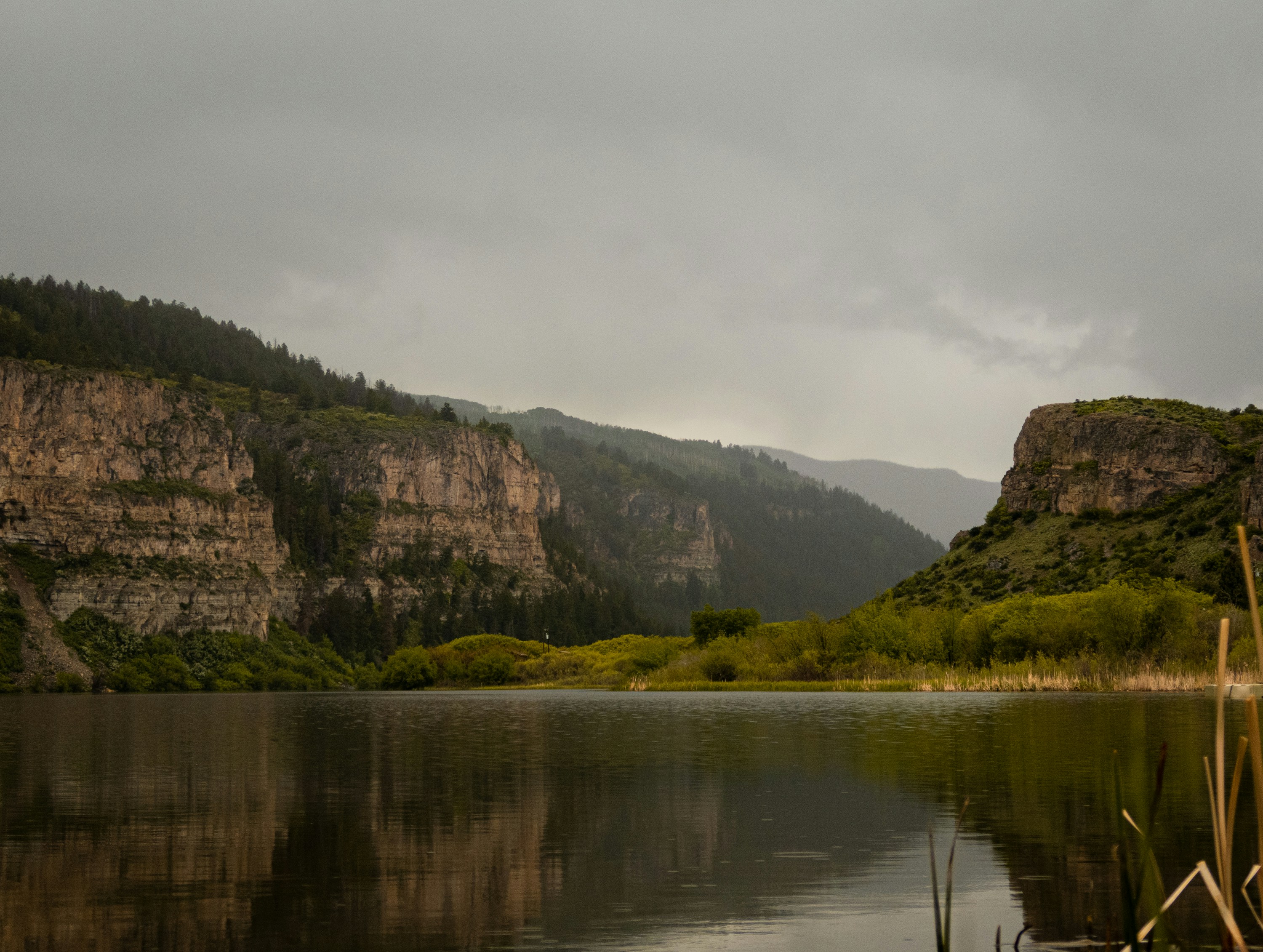 Tranquil Reflections in Mountain Embrace