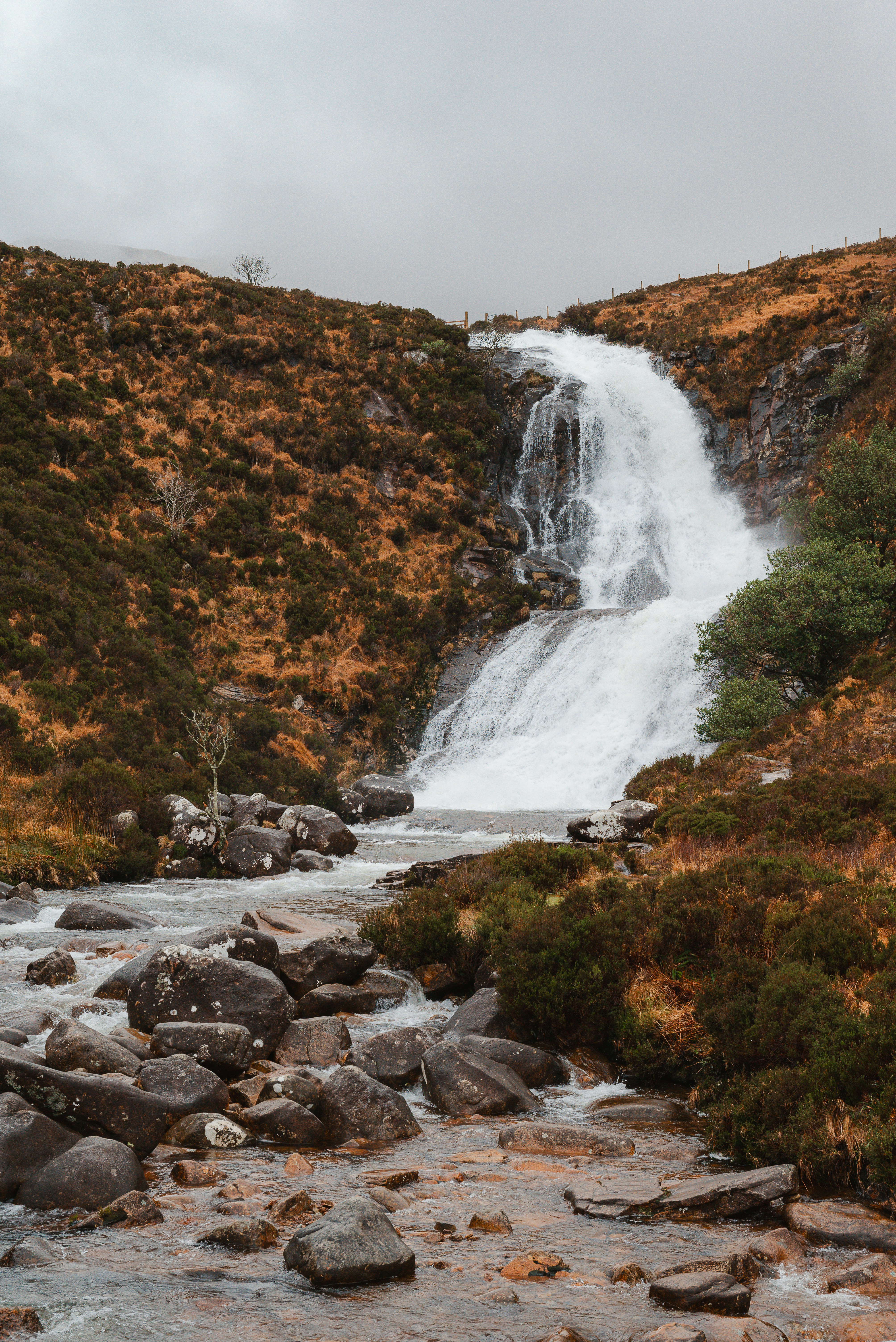 Cascade Through Orange Foothills