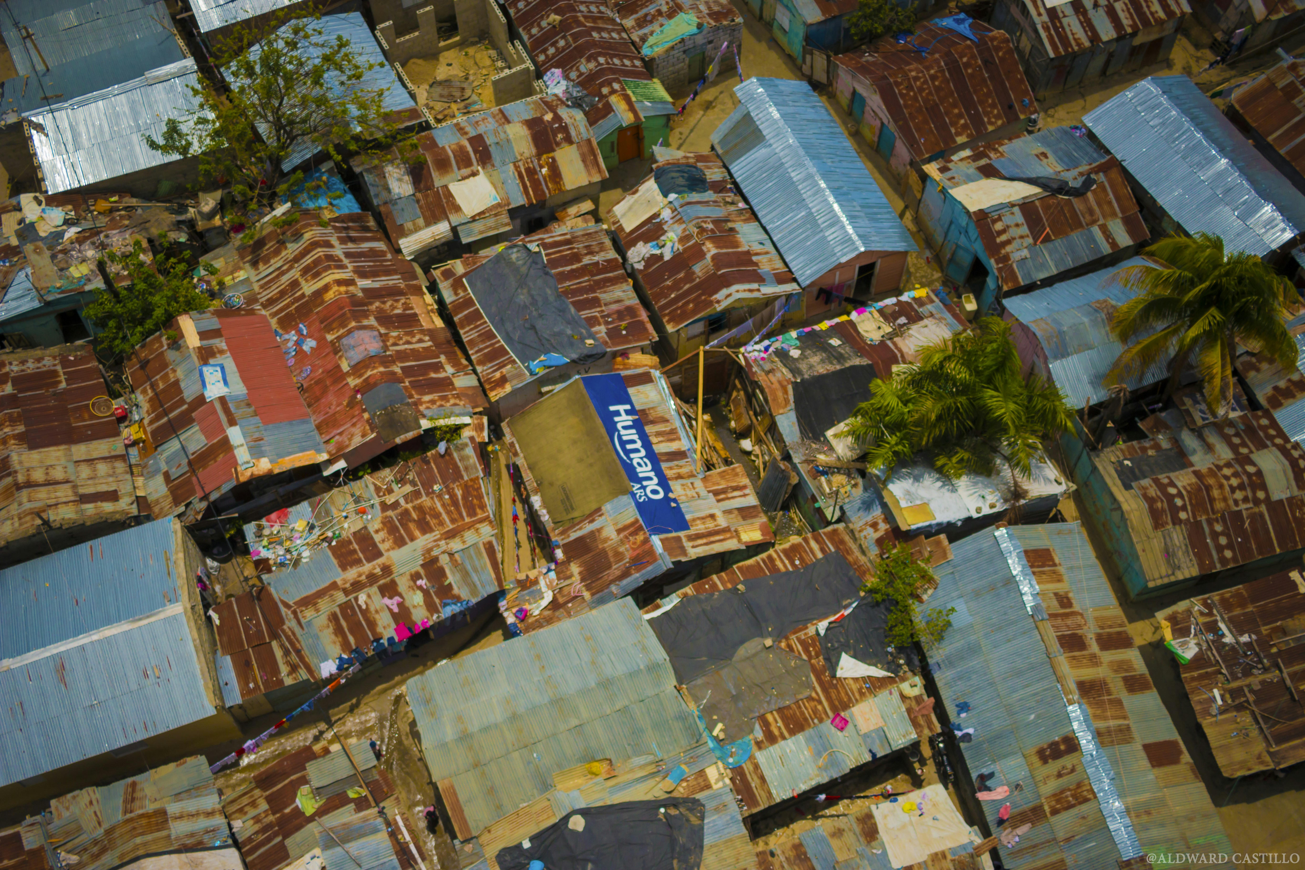 A large pile of old and rusty buildings photo – Free Neighborhood Image ...