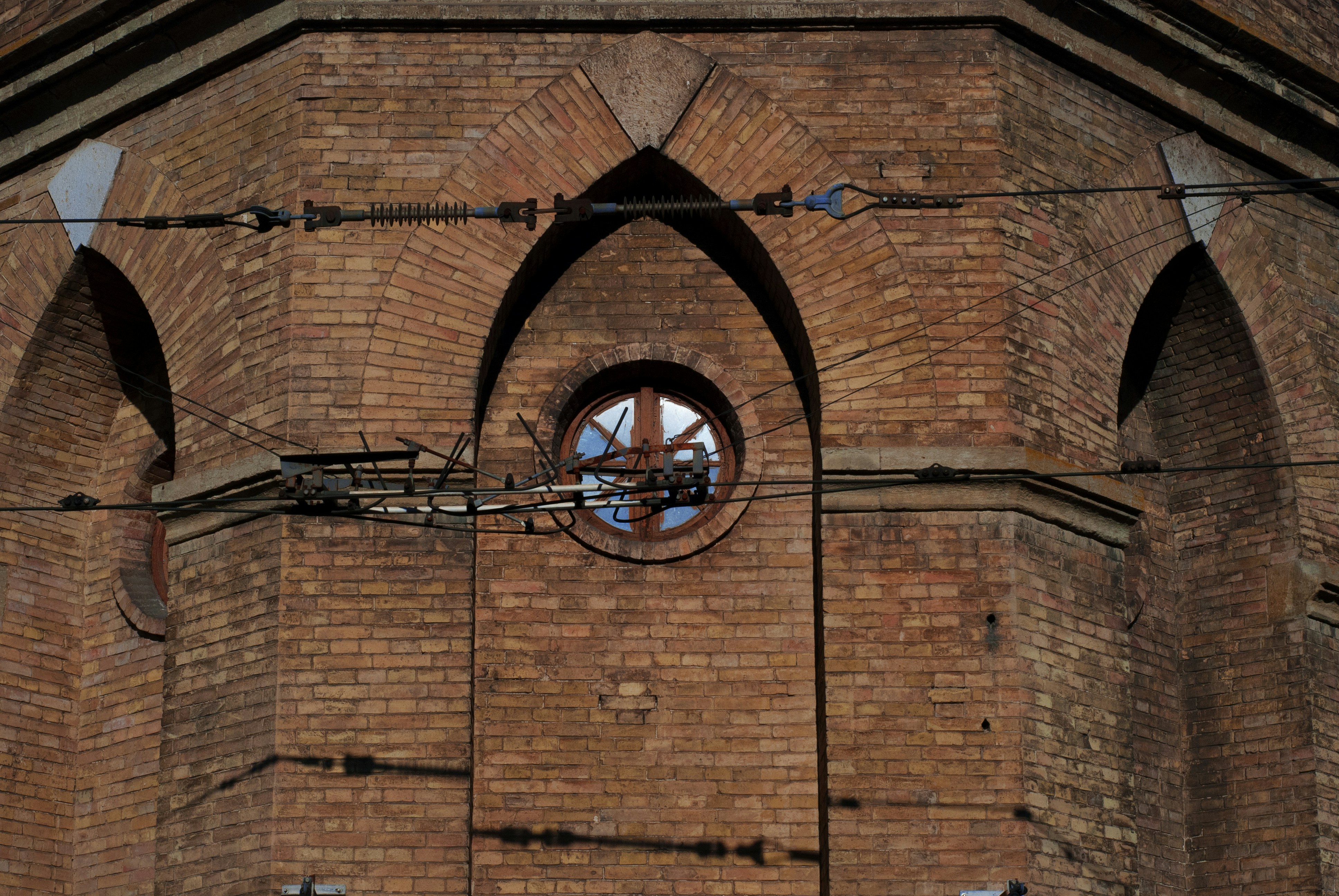 Brick wall facade with round window