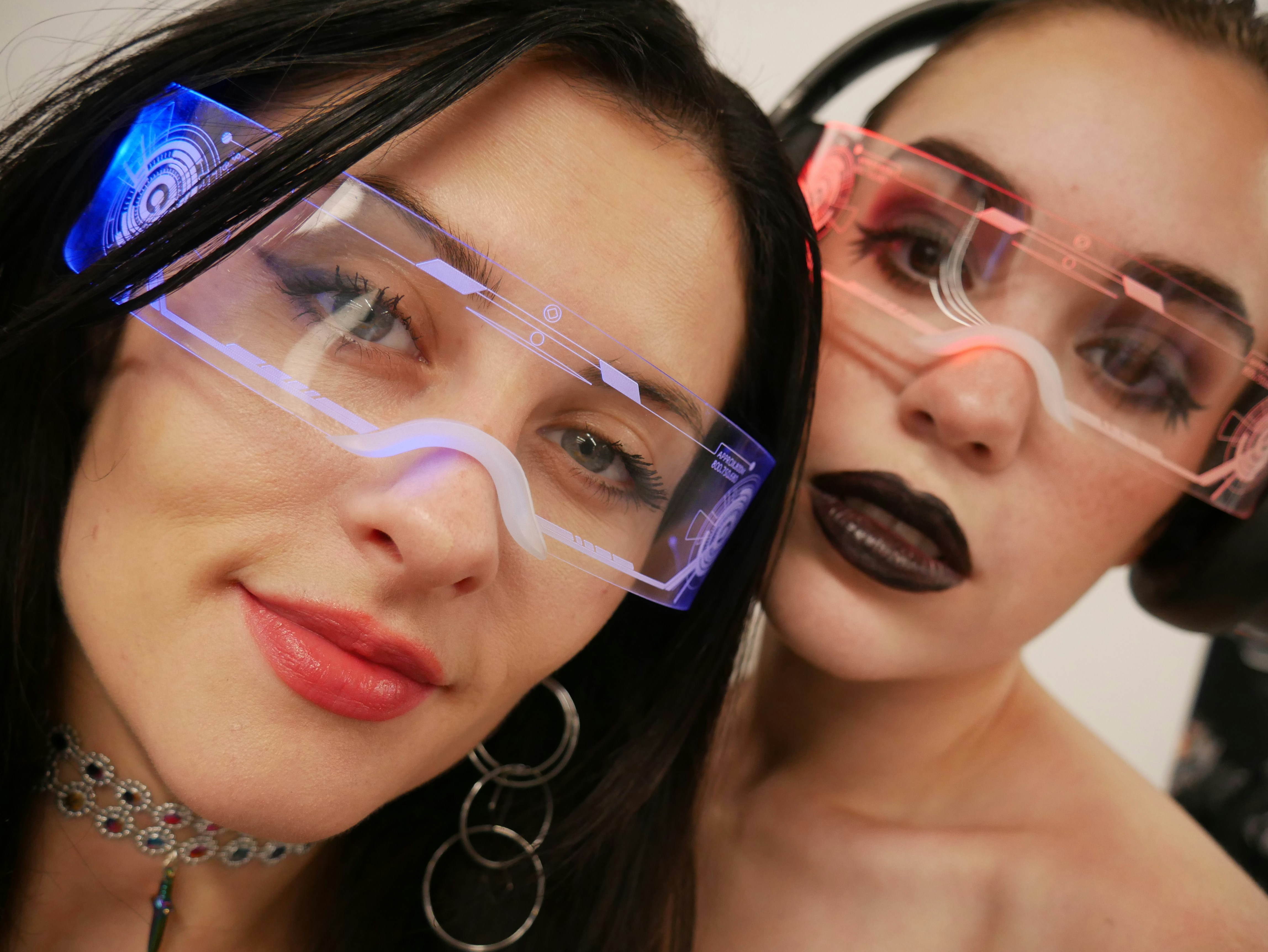 Neon Gaze: Dual Portraits in Glowing Visors