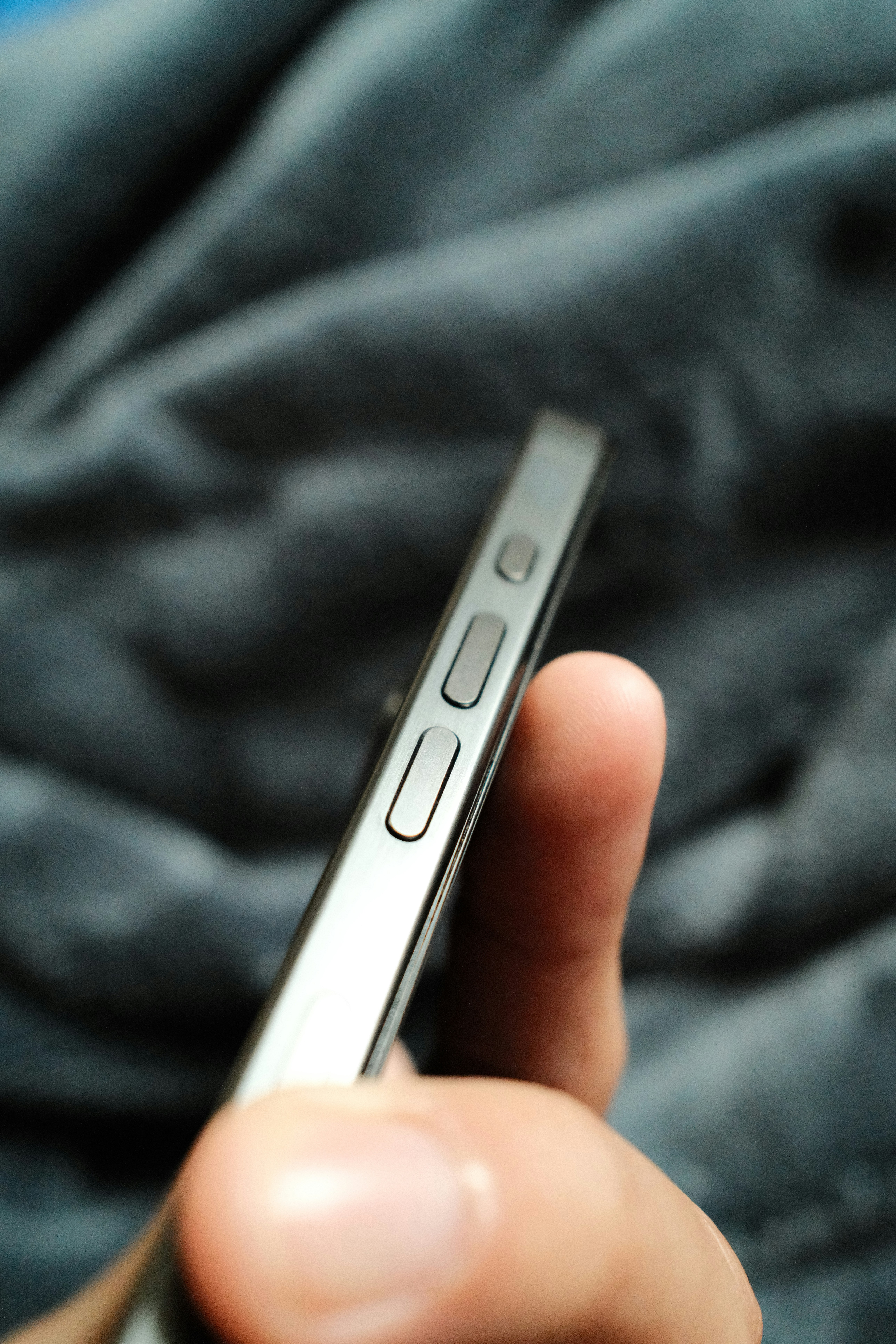 A close up of a person holding a cell phone photo – Free Spacegray ...