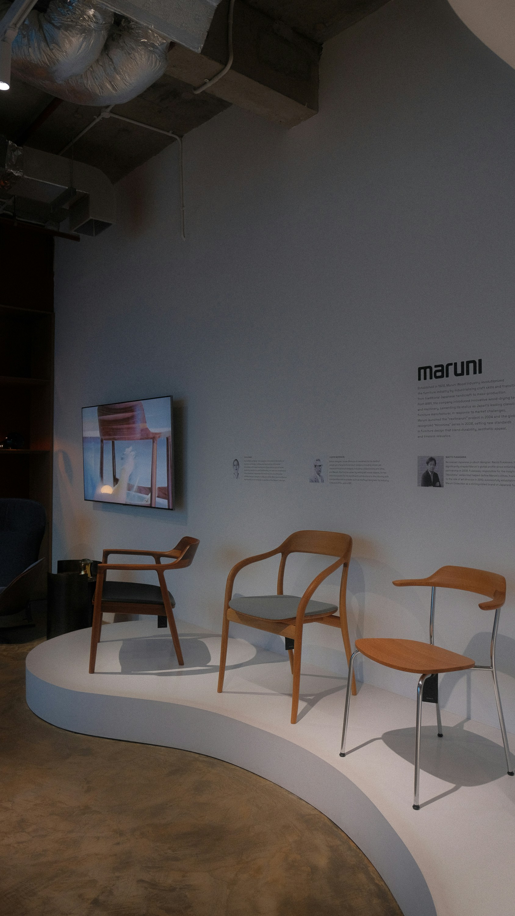 Crescent-Stage Chairs: A Quiet Gallery Dialogue