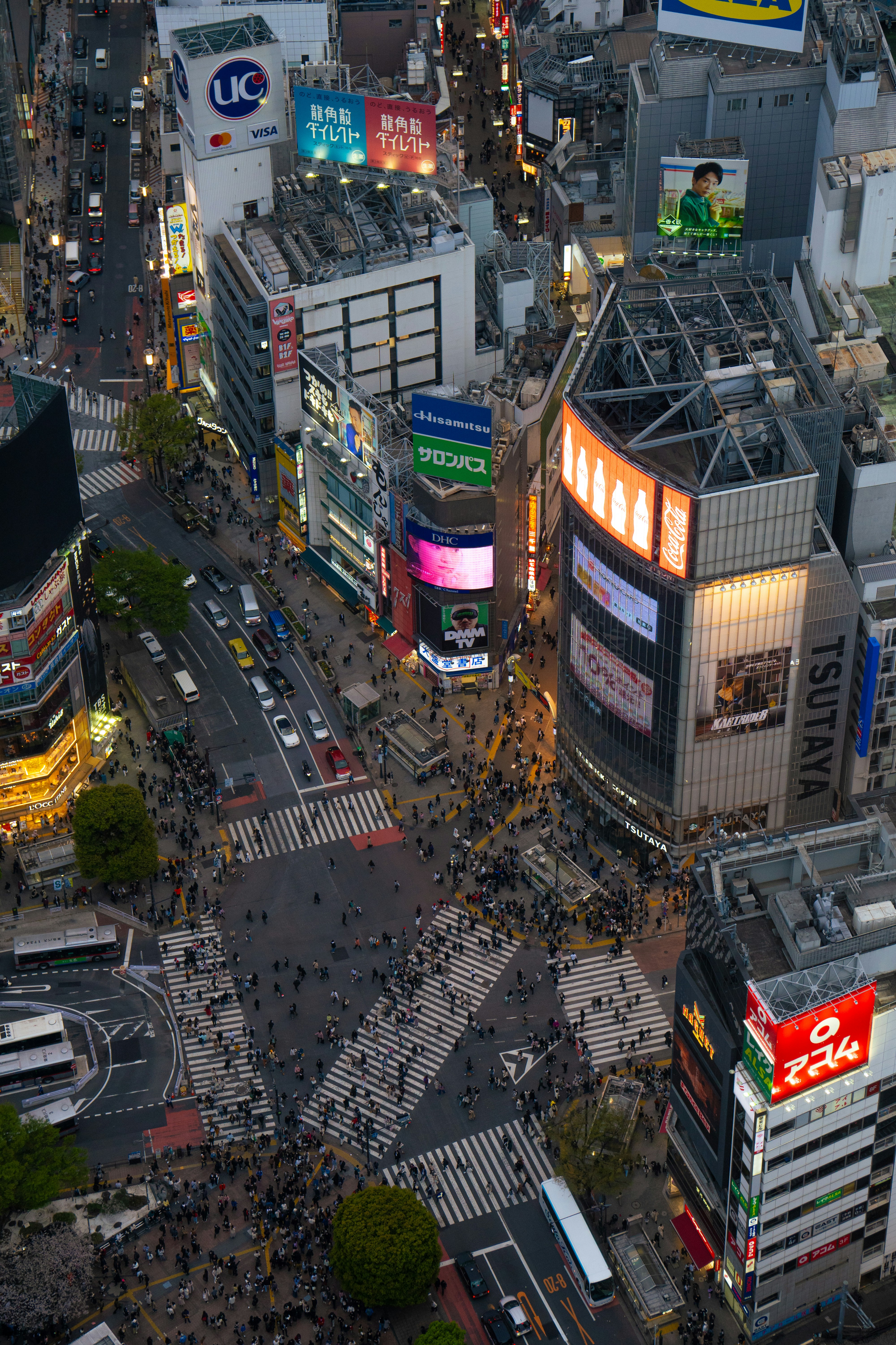 Neon Pulse Over Shibuya Crossing: A Bird's-Eye View at Dusk