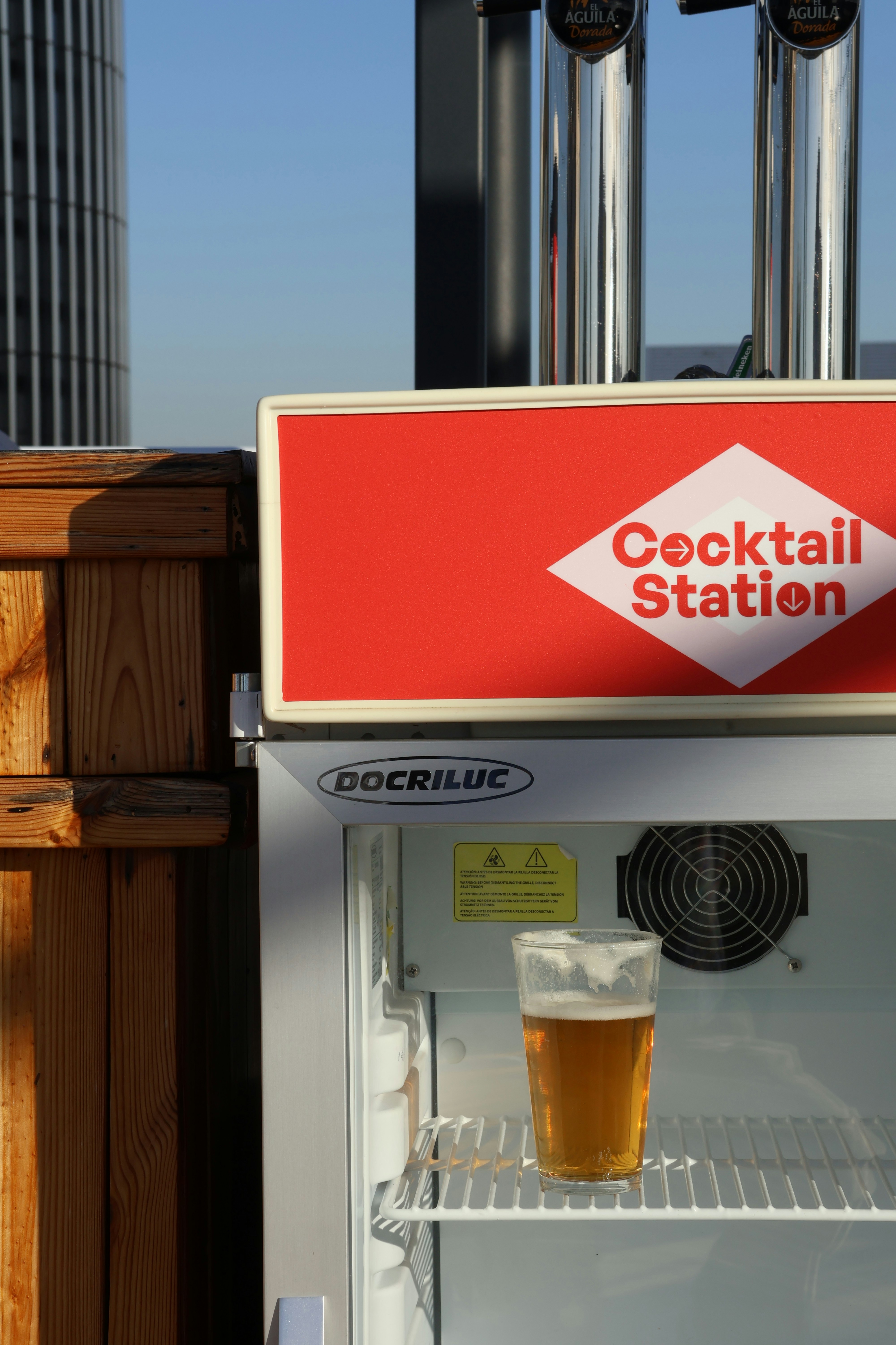 Crimson Cocktail Station Sign Anchored by Wood and Stainless