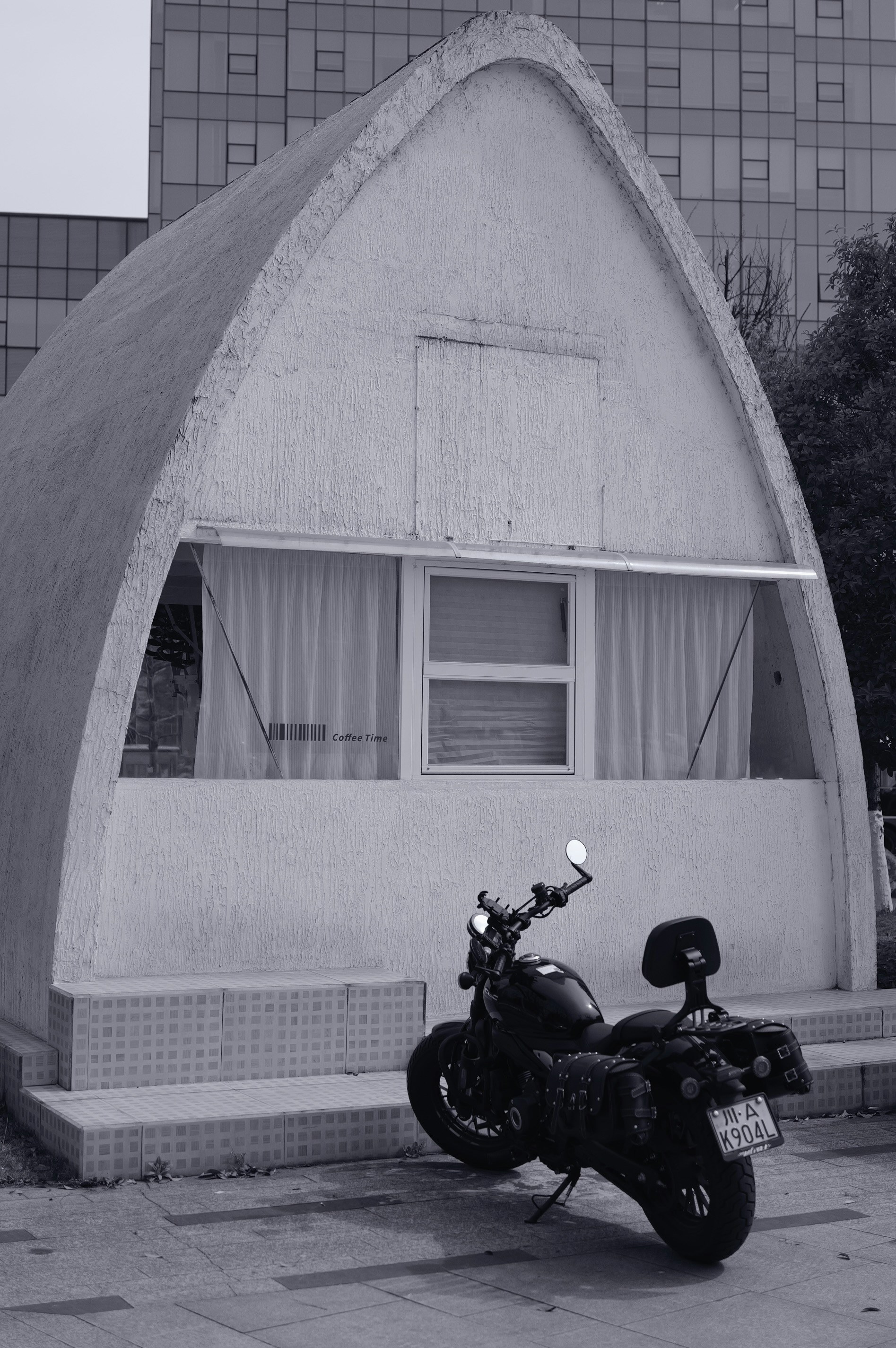 A motorcycle parked in front of a building