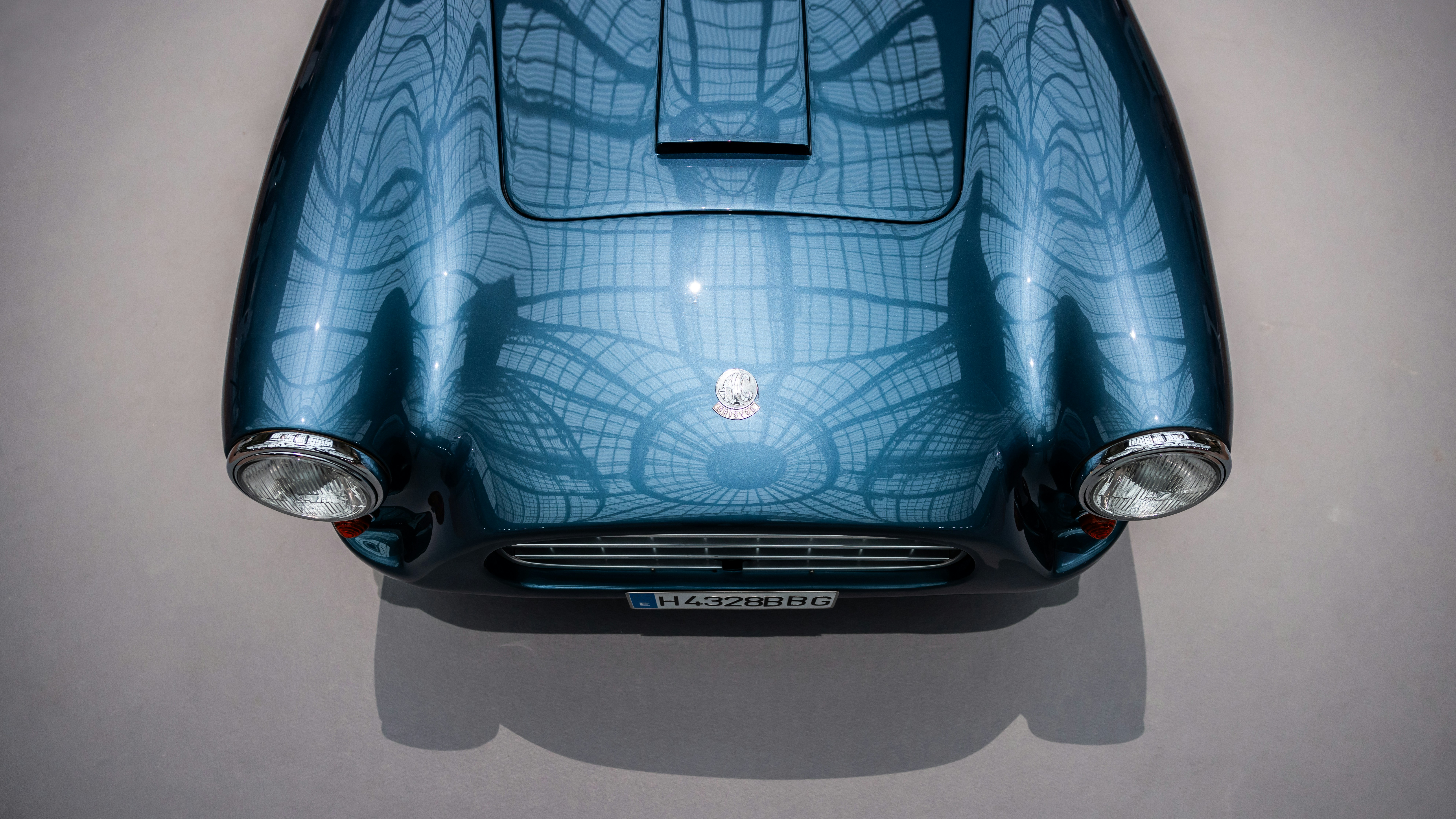 The back of a car with a blue design on it photo – Free Car Image on ...